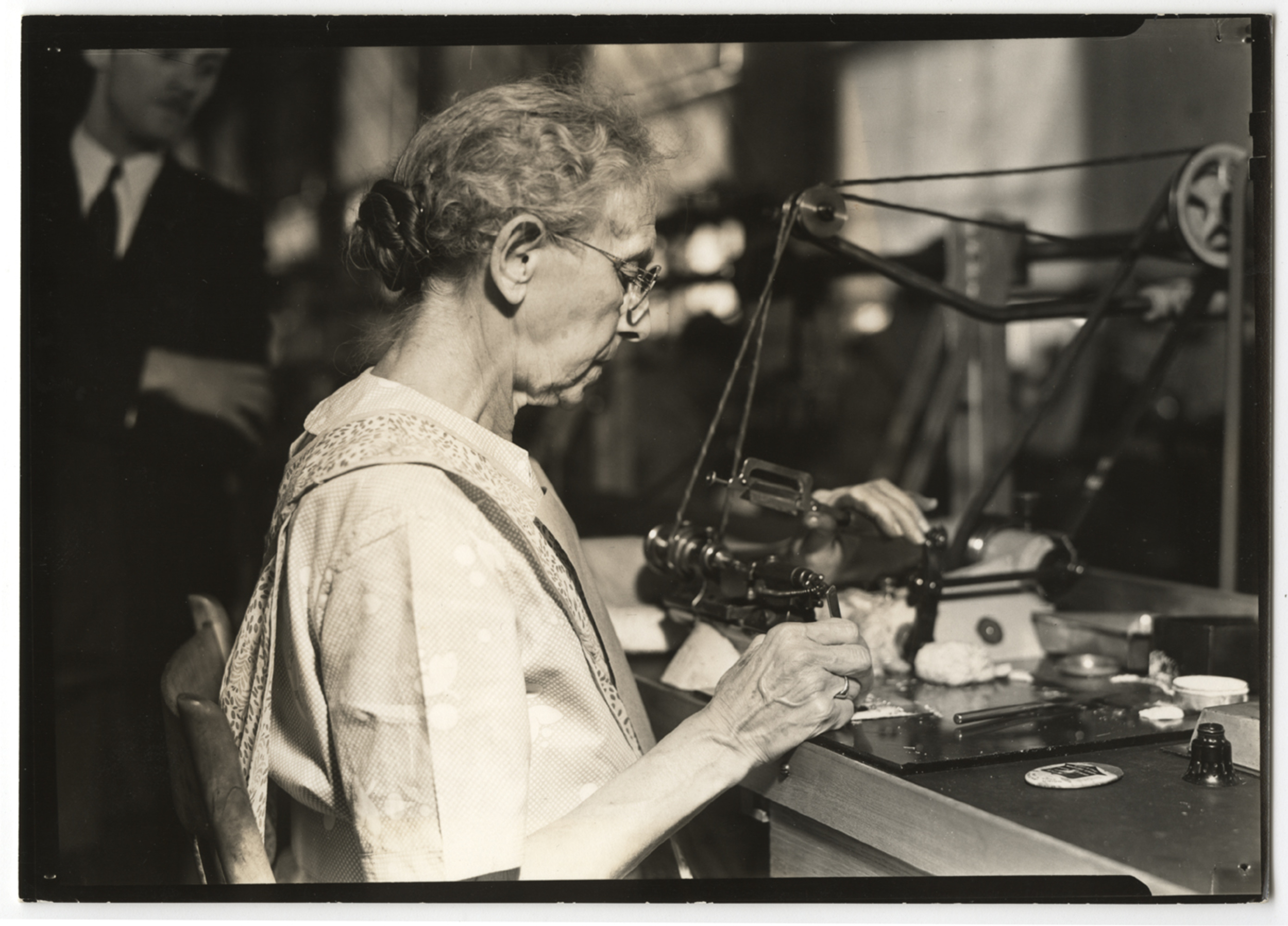 [Semi-skilled worker operating wig wag machine for polishing pivots and ...