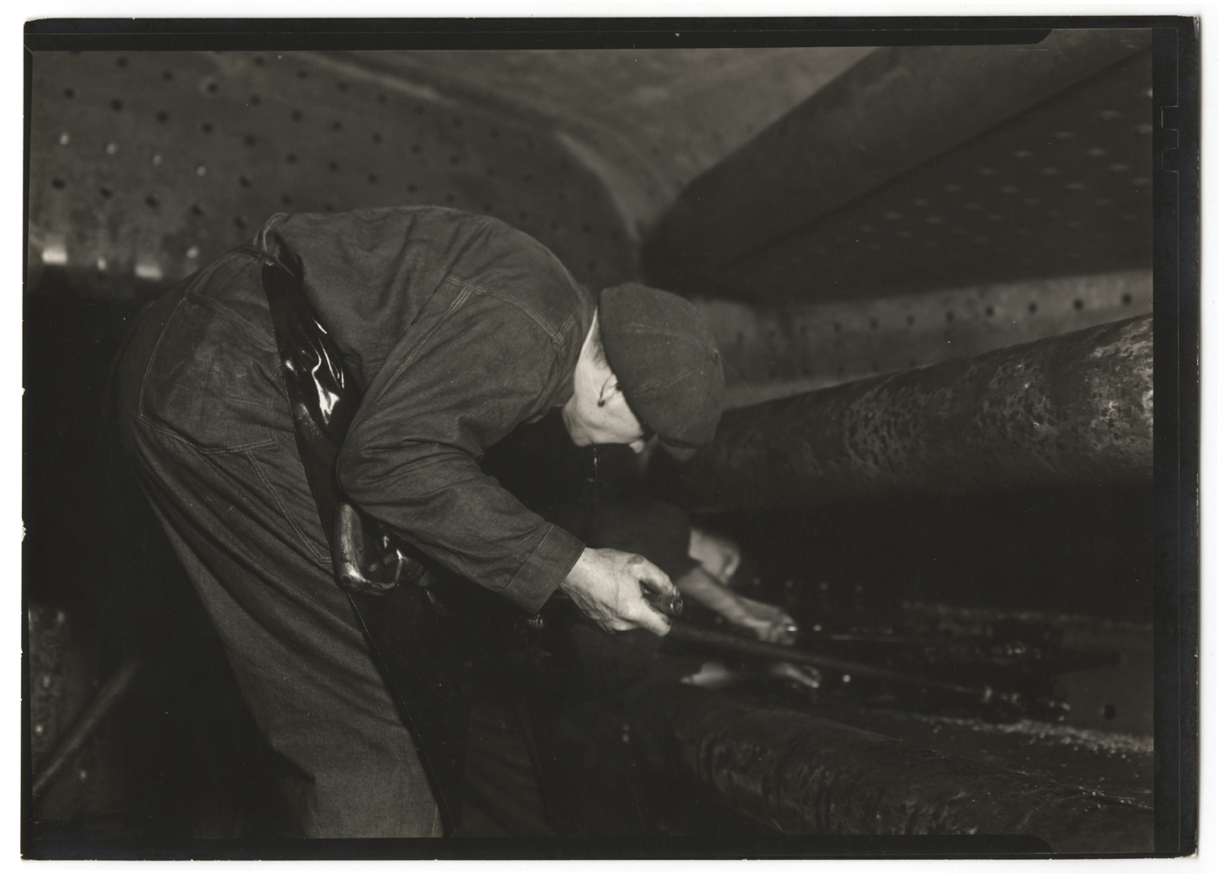 [Boilermaker tapping for stay-bolts in boiler of modern locomotive ...
