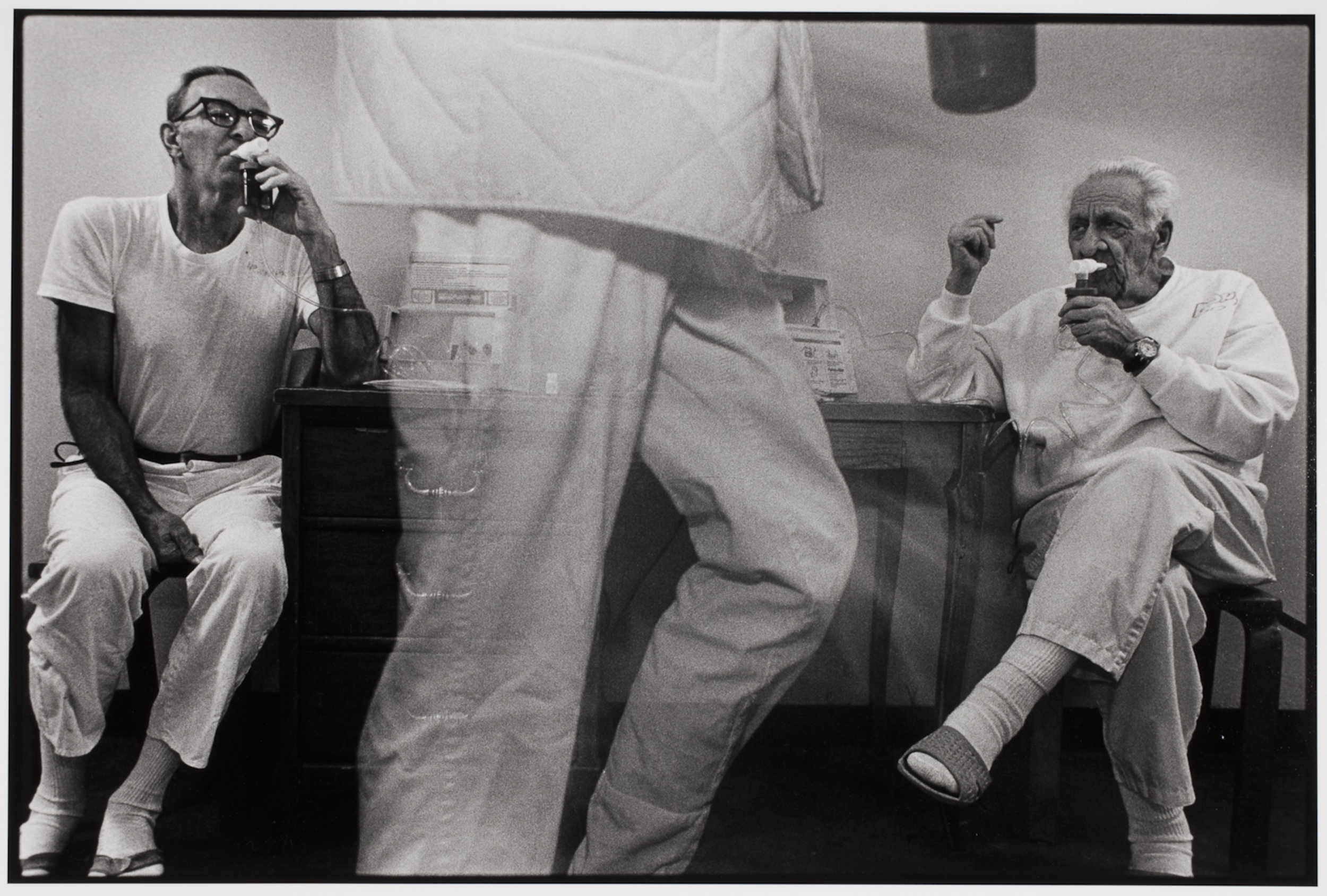 Inmates at the Hamilton Aged and Infirmed facility take their twice ...