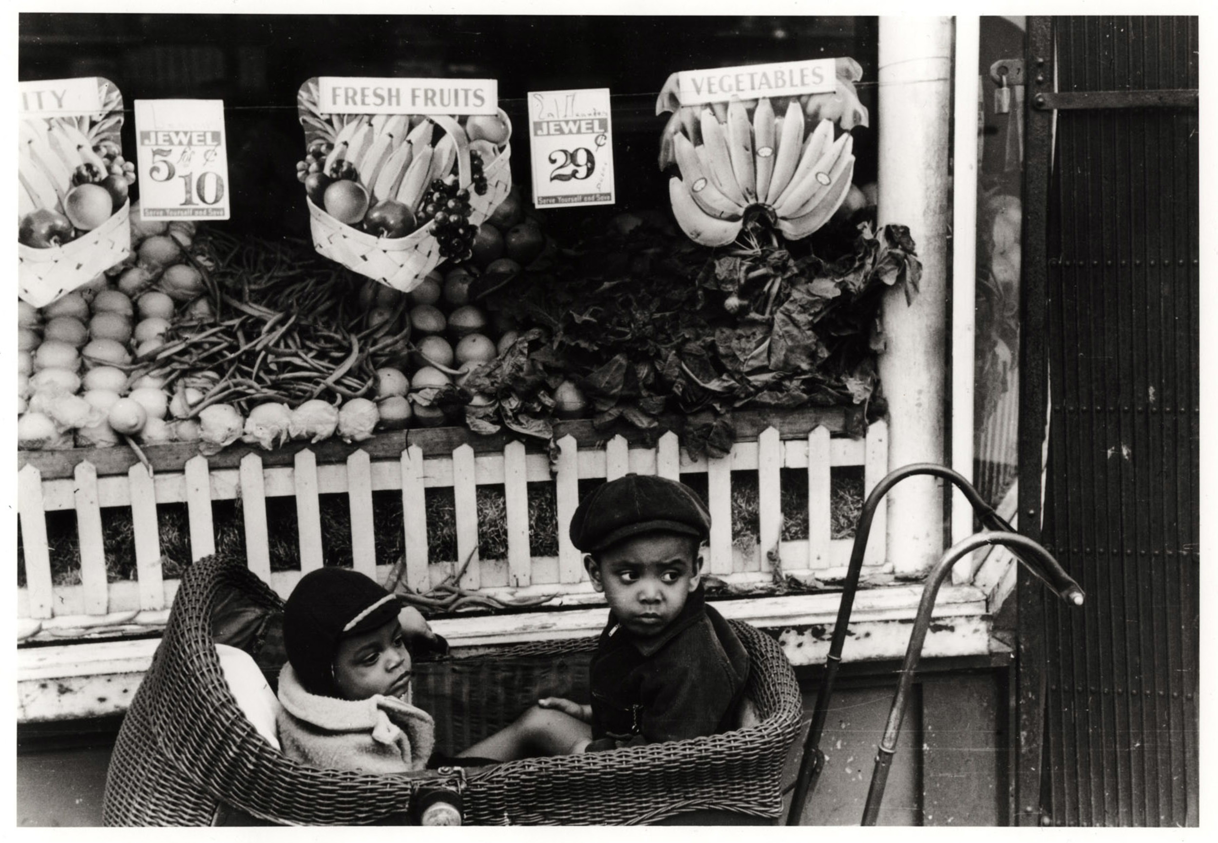 Children in front of a grocery store | International Center of Photography
