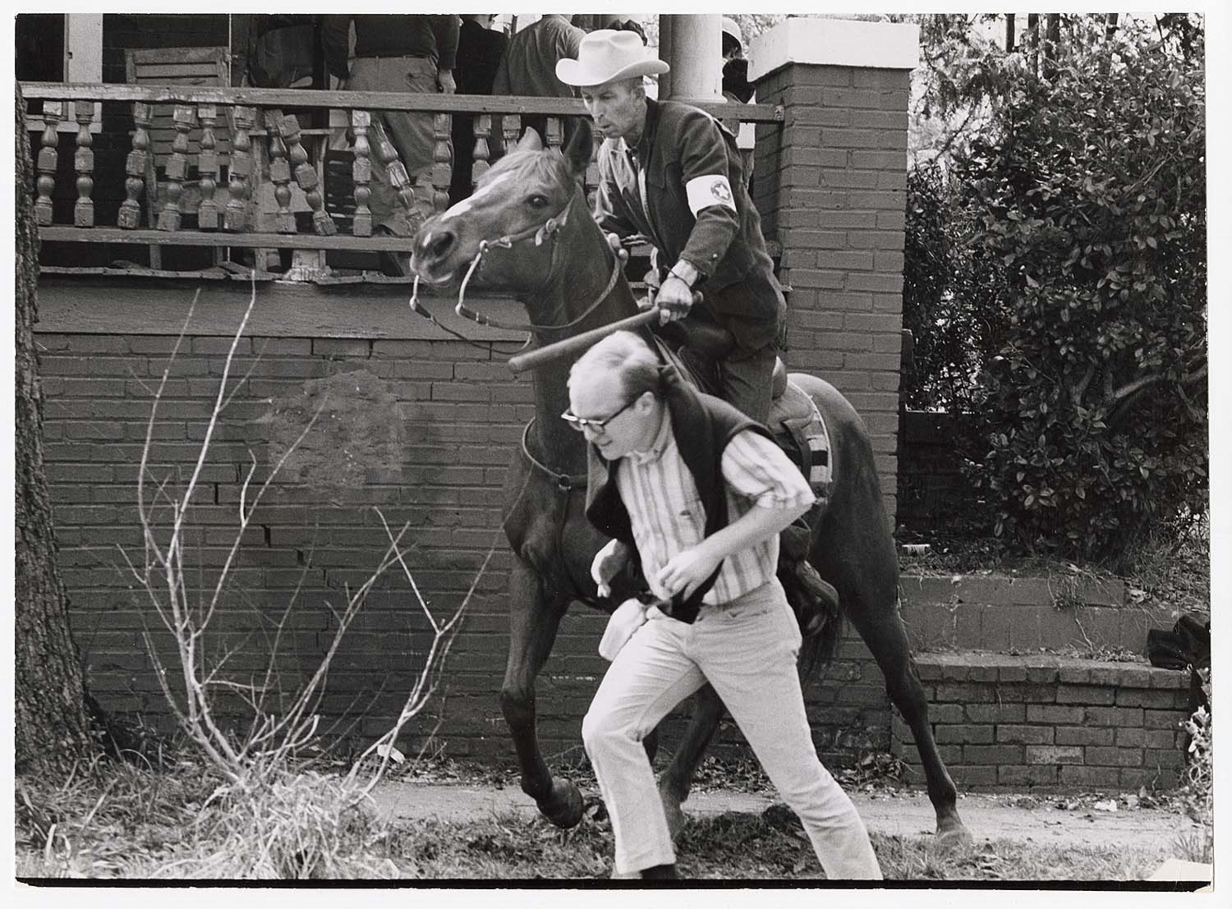 Mounted posse man swings at demonstrators in Selma | International ...