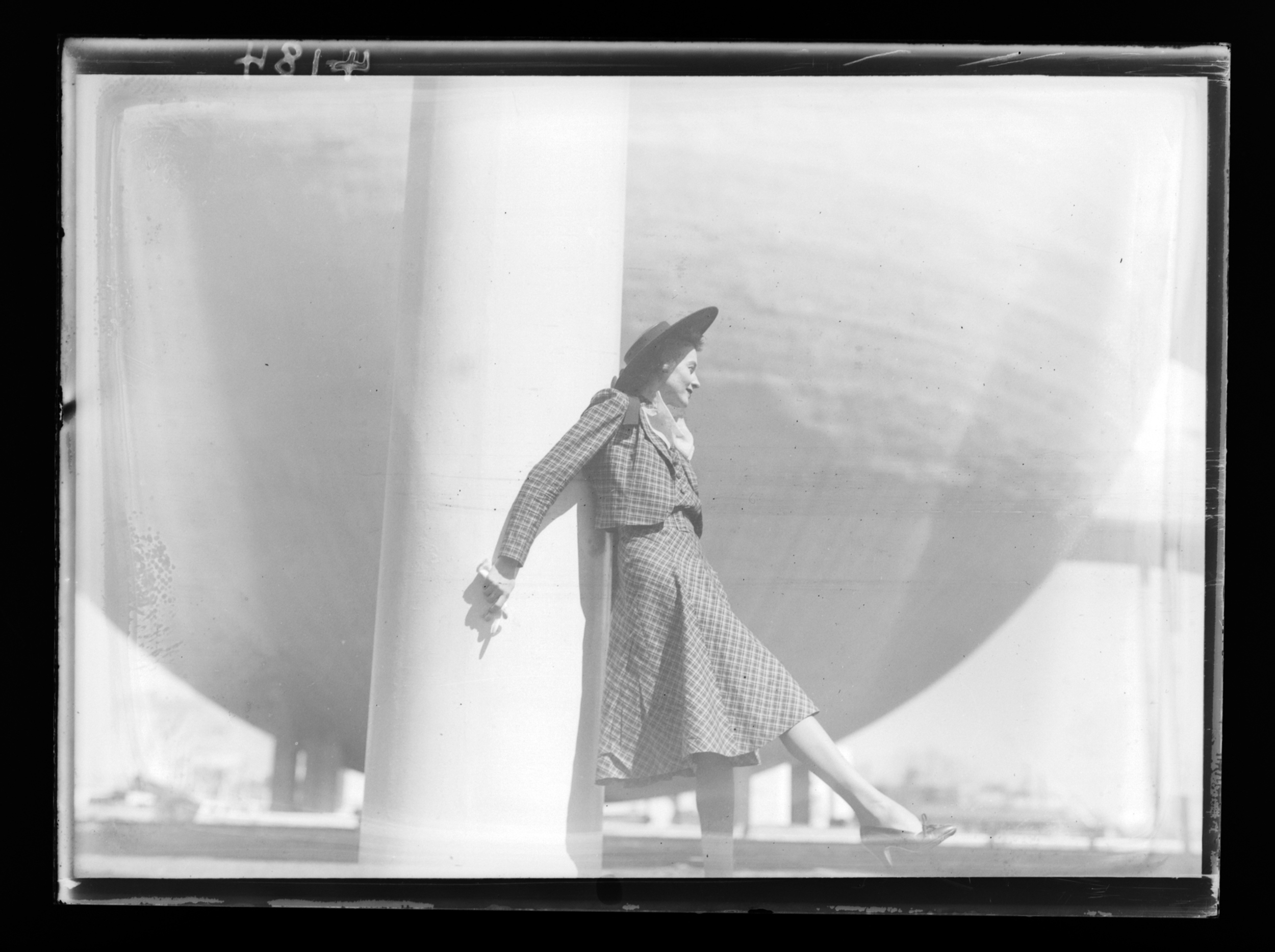 [Woman standing under the Helicline to the Perisphere, World's Fair ...