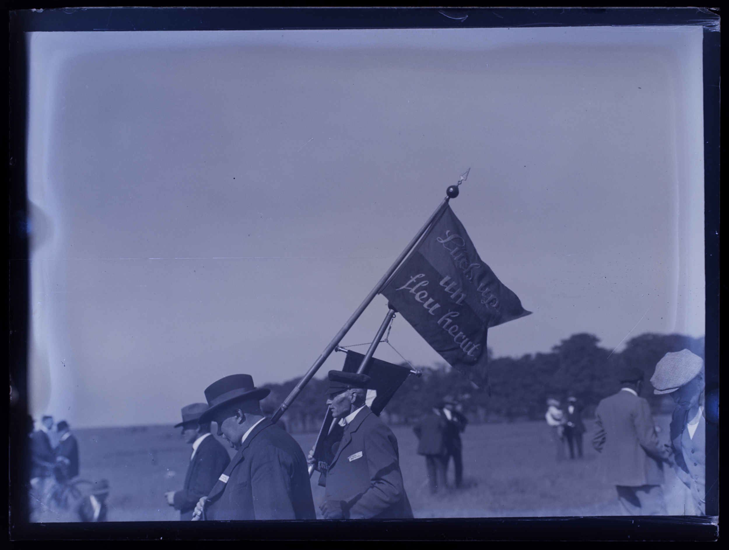 [Men carrying flags, Altona, Germany] | International Center of Photography