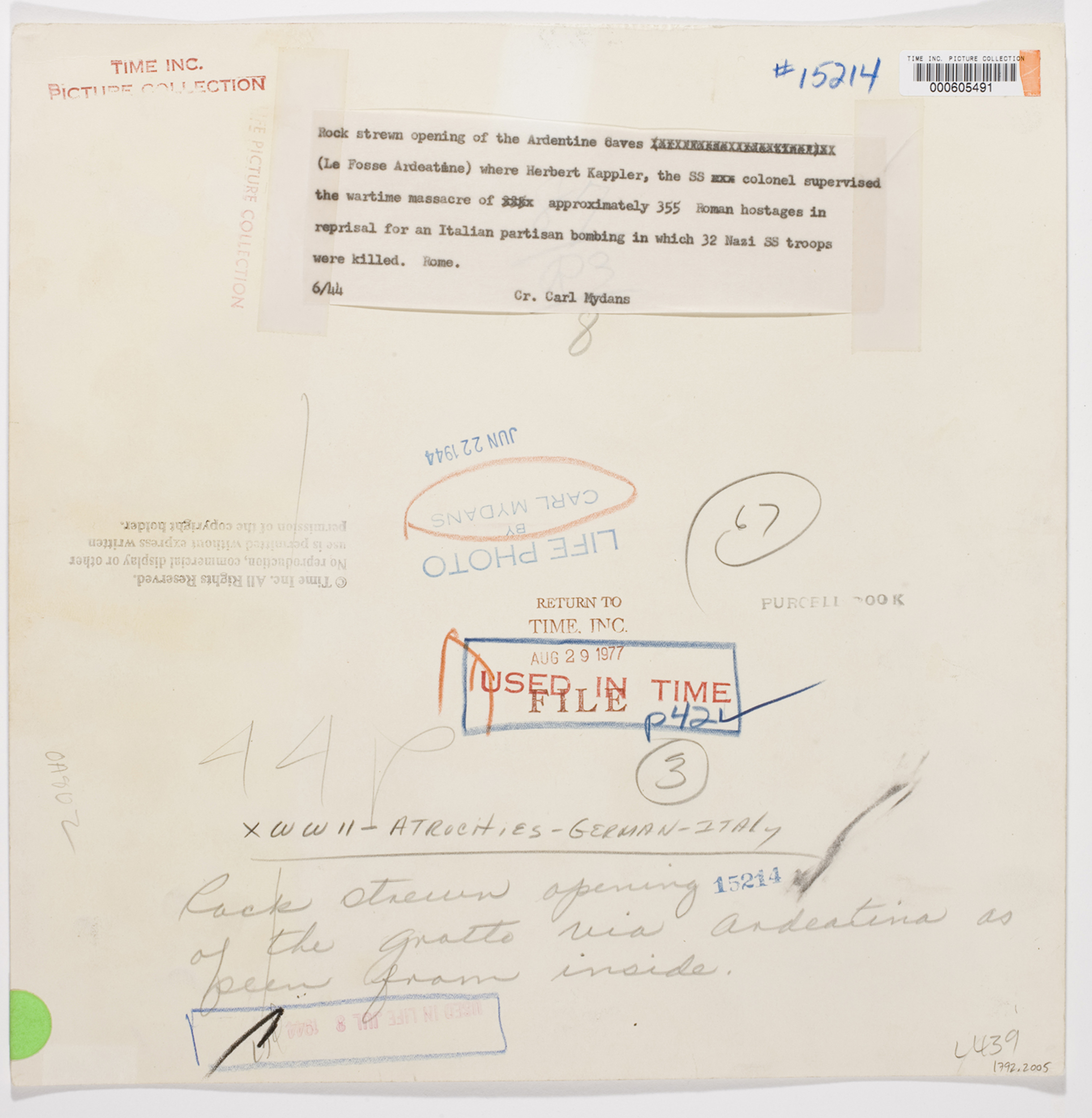 Rock strewn opening of the Ardentine caves (Le Fosse Ardeatine) where ...