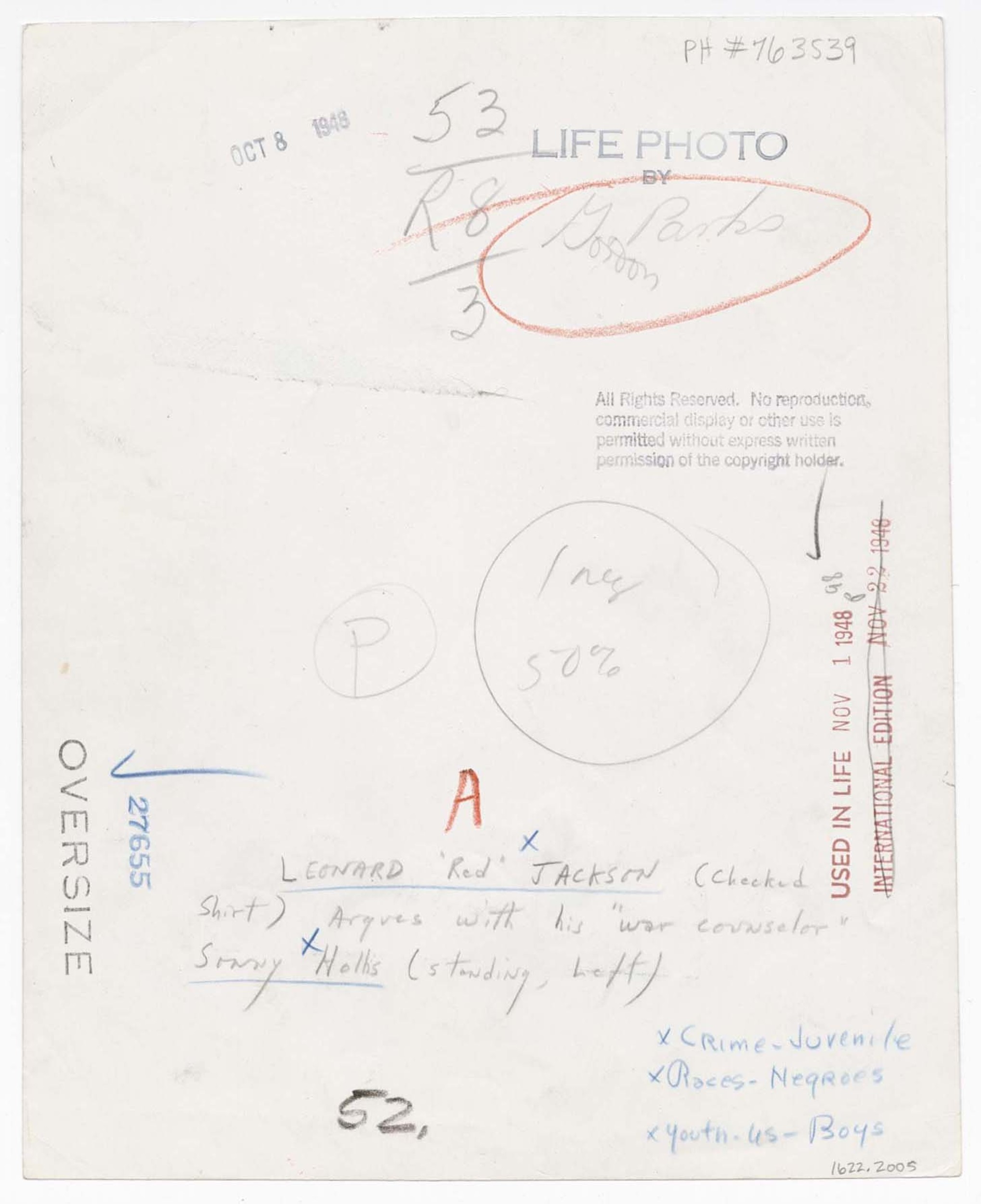 Leonard "Red" Jackson (checkered shirt) argues with his "war counselor ...