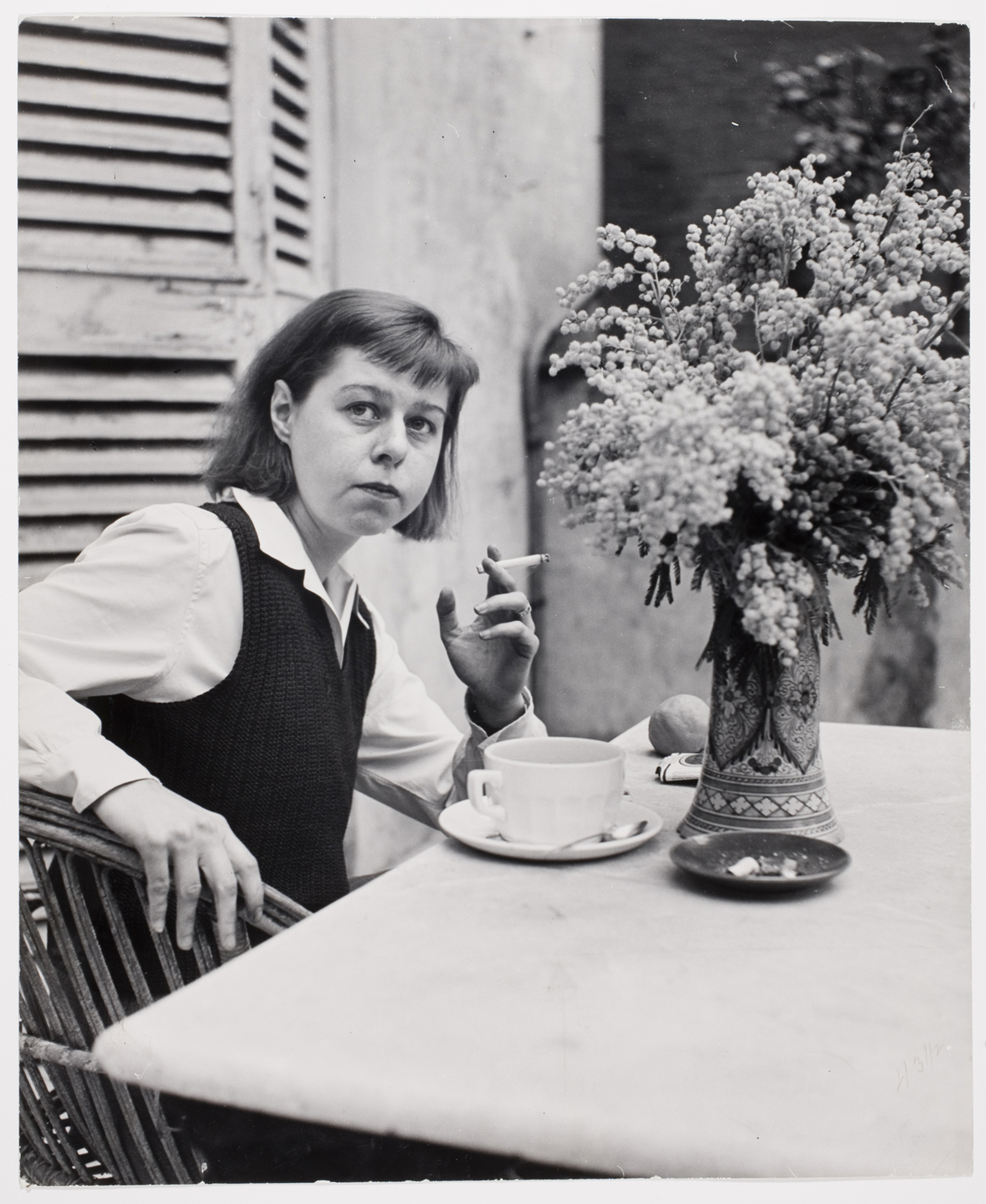 [Carson McCullers smoking a cigarette at home, South Nyack, New York ...