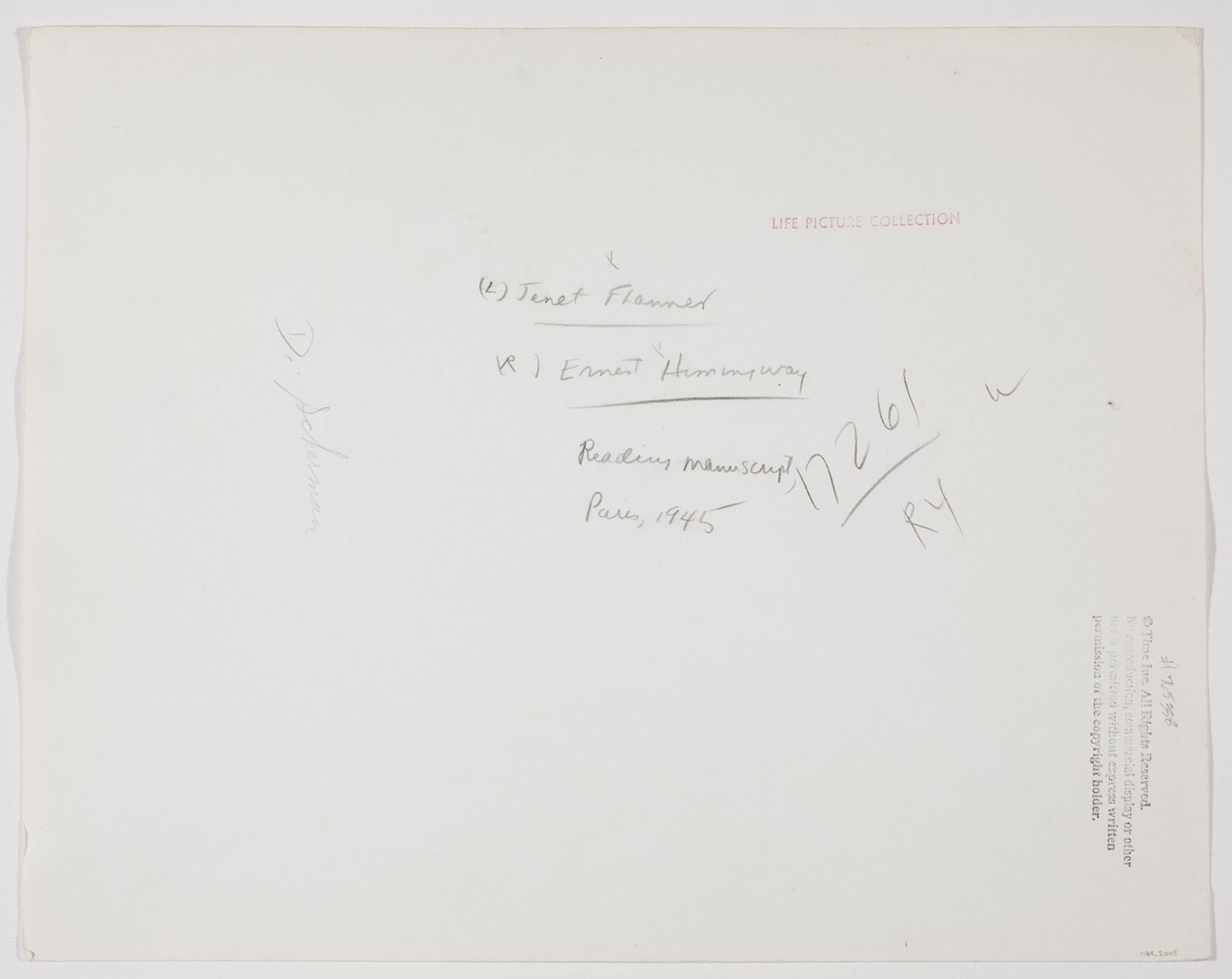 [Janet Flanner and Ernest Hemingway reading manuscript together in a ...