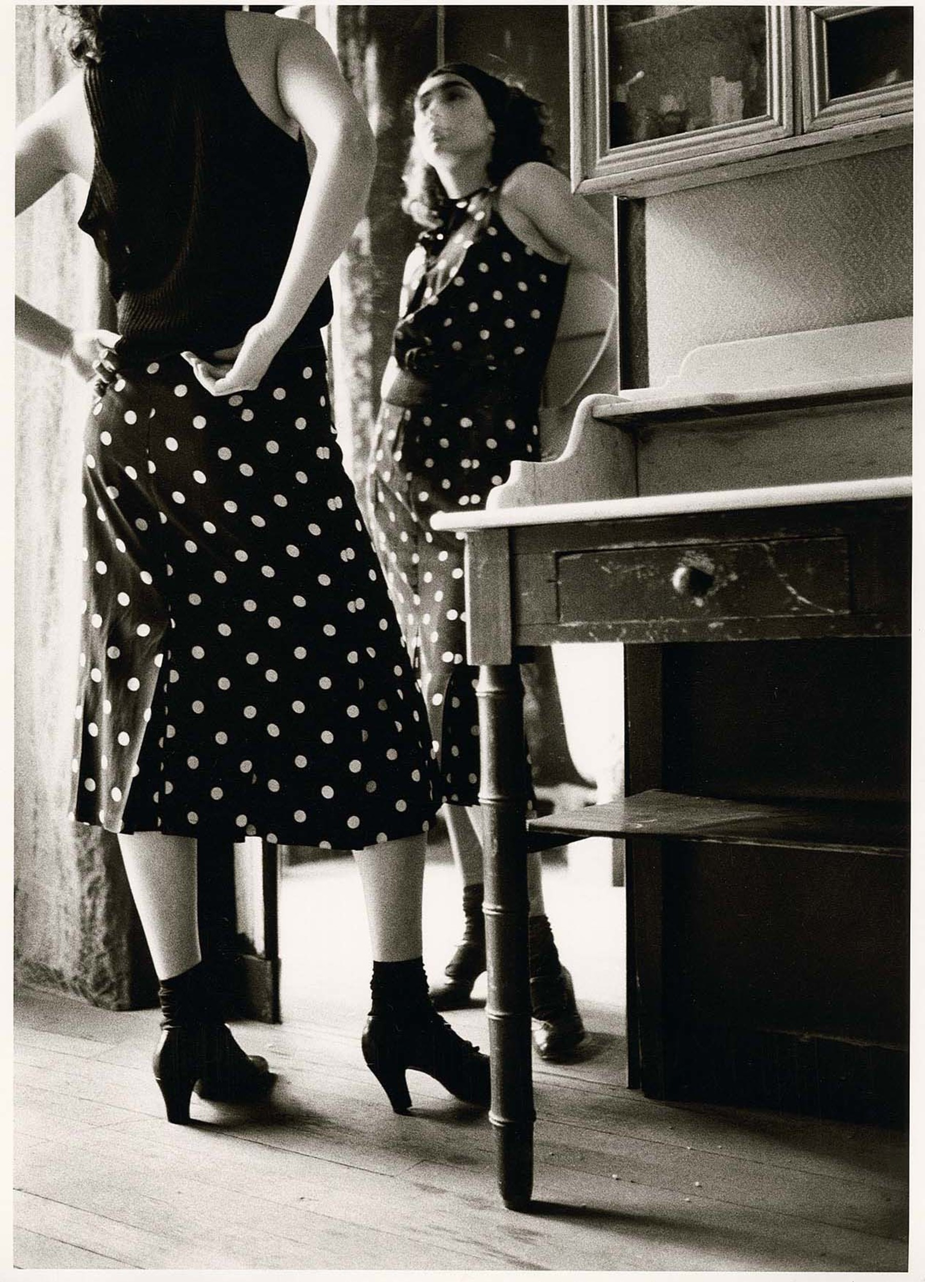 [Woman standing in front of mirror] | International Center of Photography