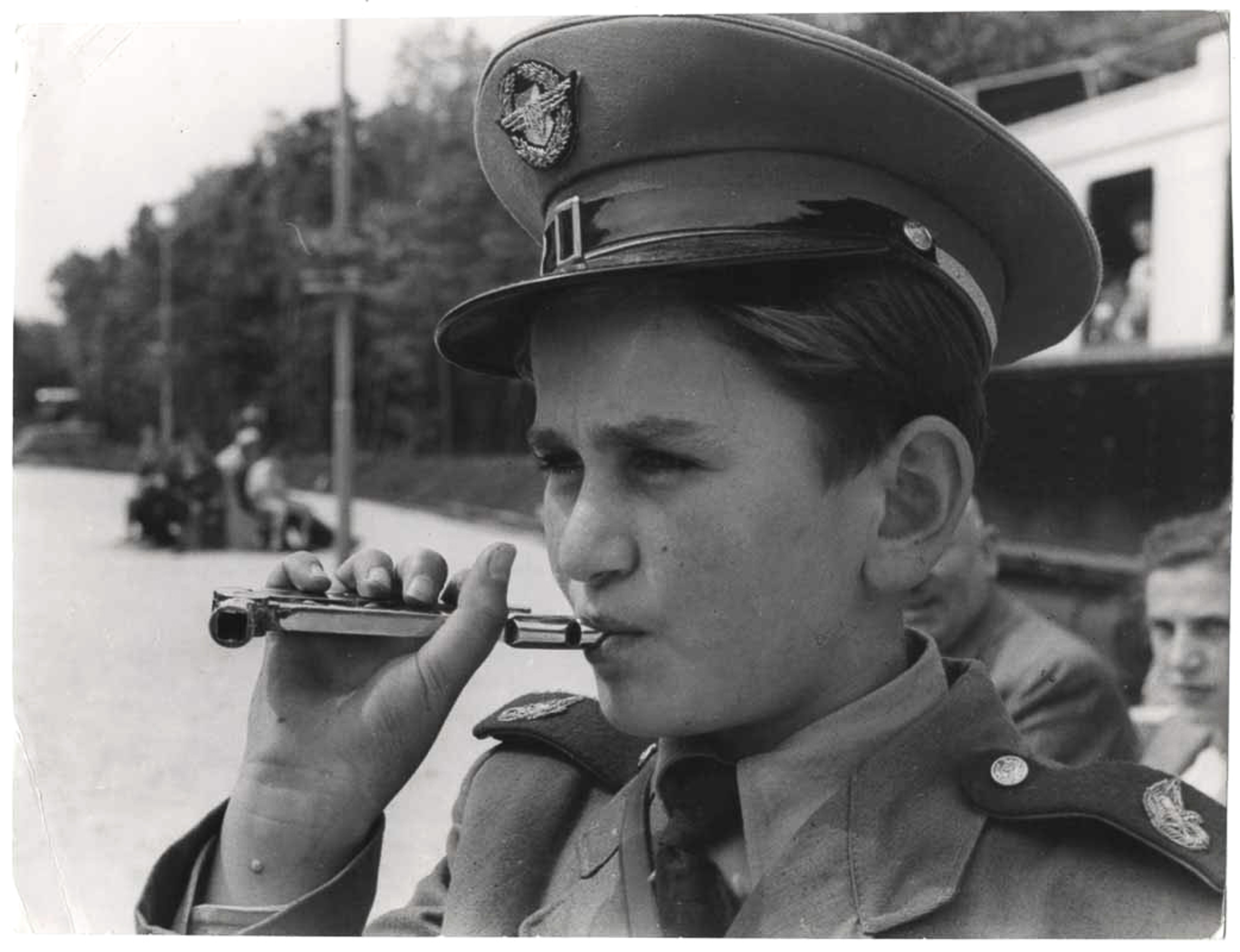 [Young train guard blows his whistle, Budapest, Hungary ...