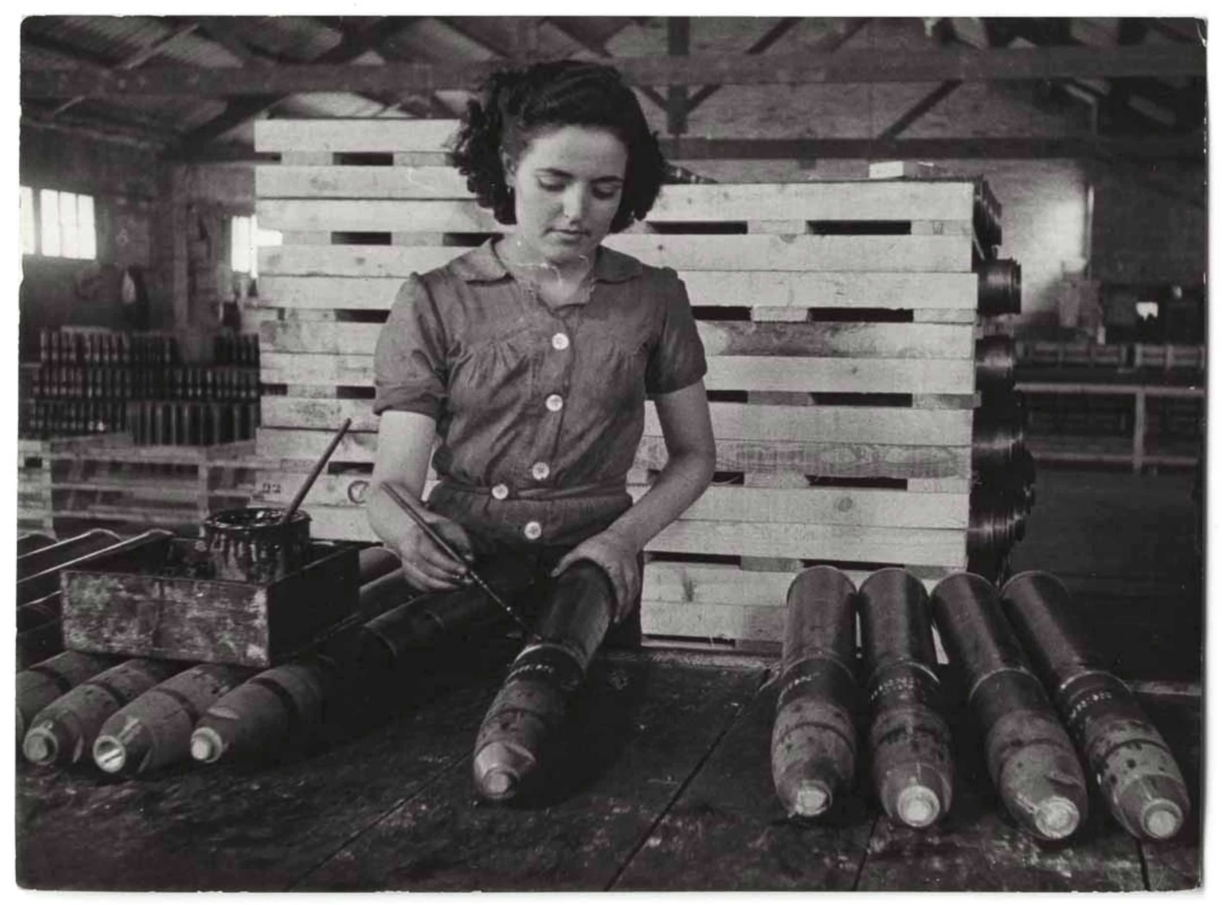 [Woman painting bombs in a munitions factory, Spain] | International ...