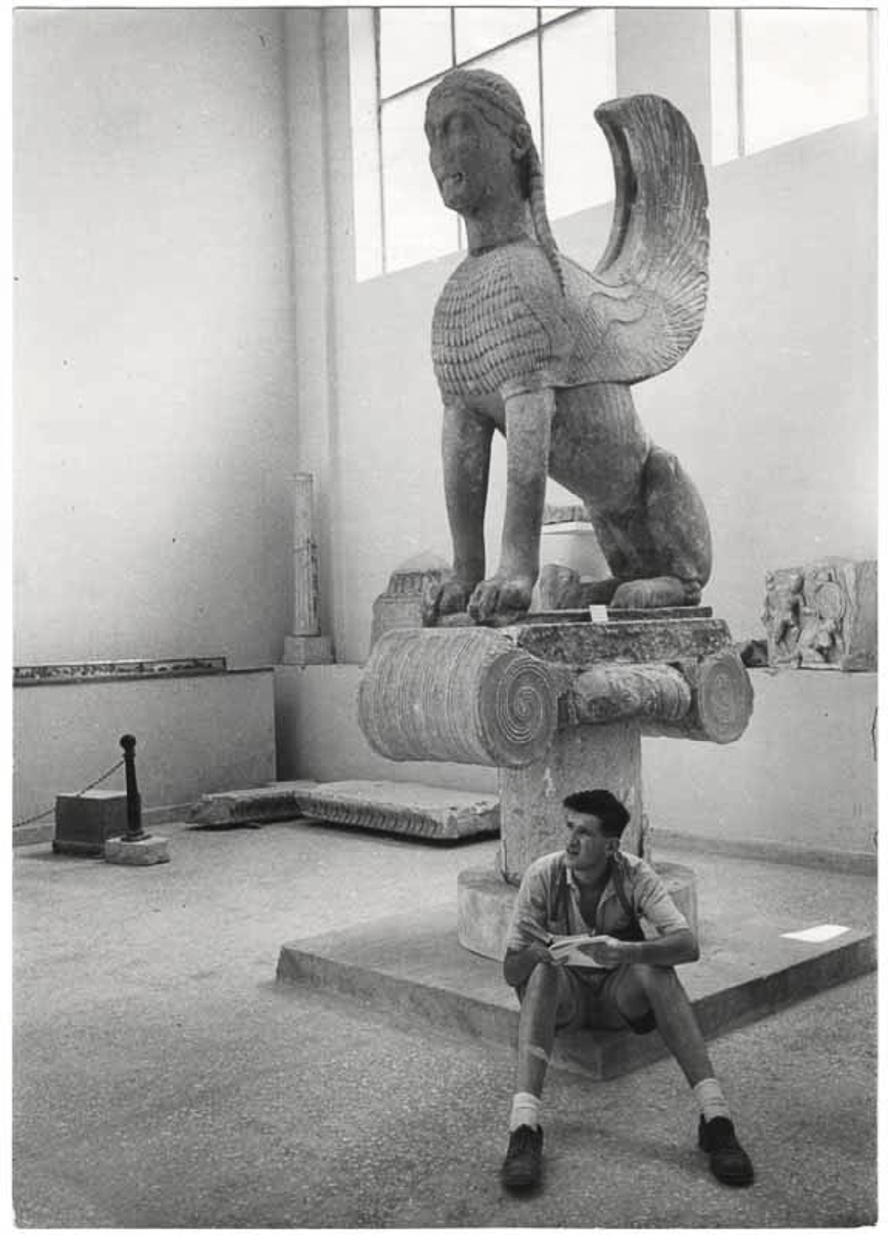 [Young man resting at base of Sphinx, Delphi, Greece] | International ...
