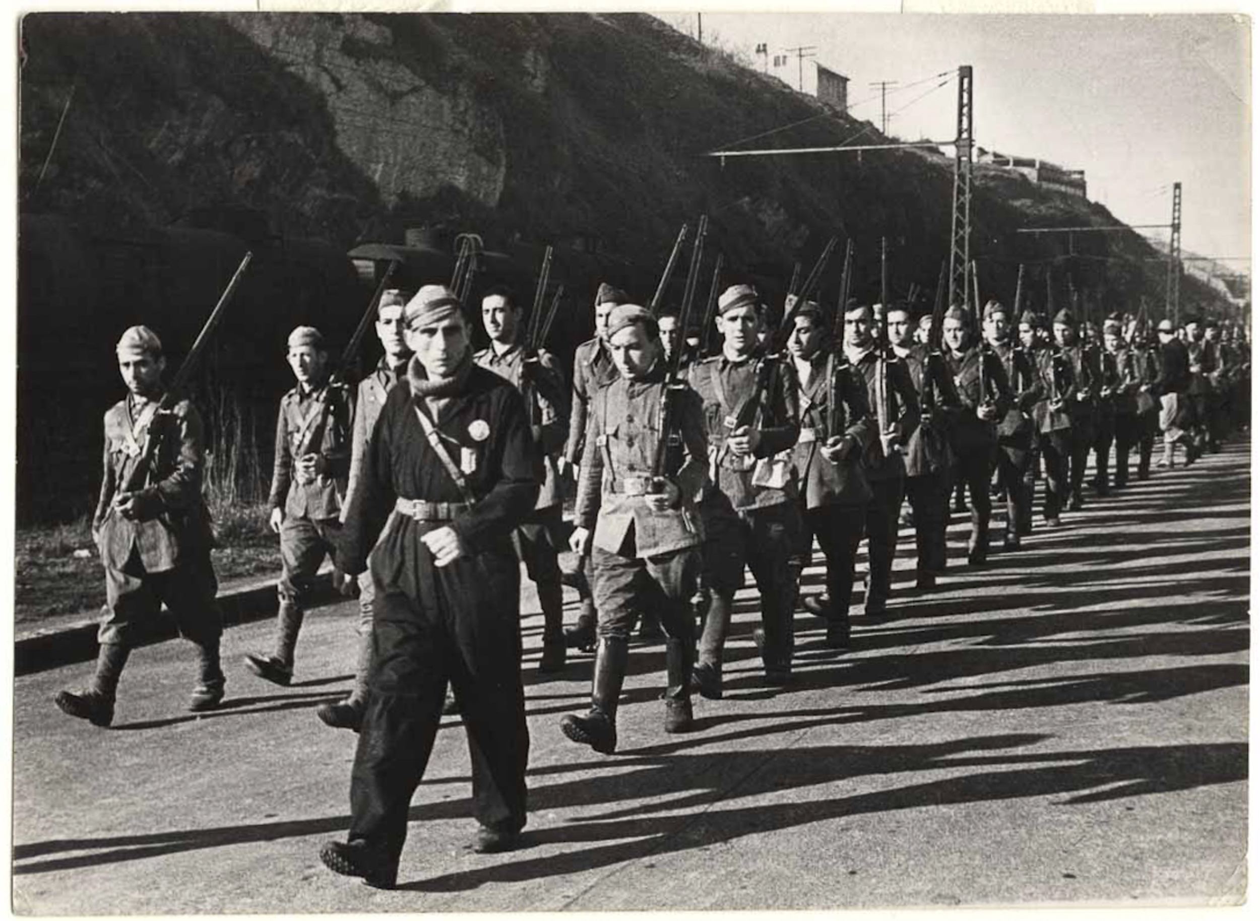 [Soldiers with guns marching out of Bilbao, Spain] | International ...