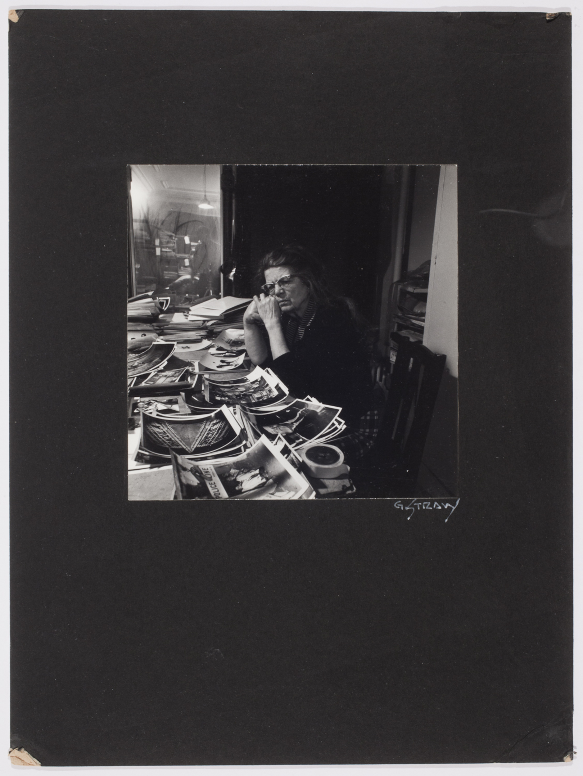 [Wilma Wilcox editing Weegee's photographs] | International Center of ...
