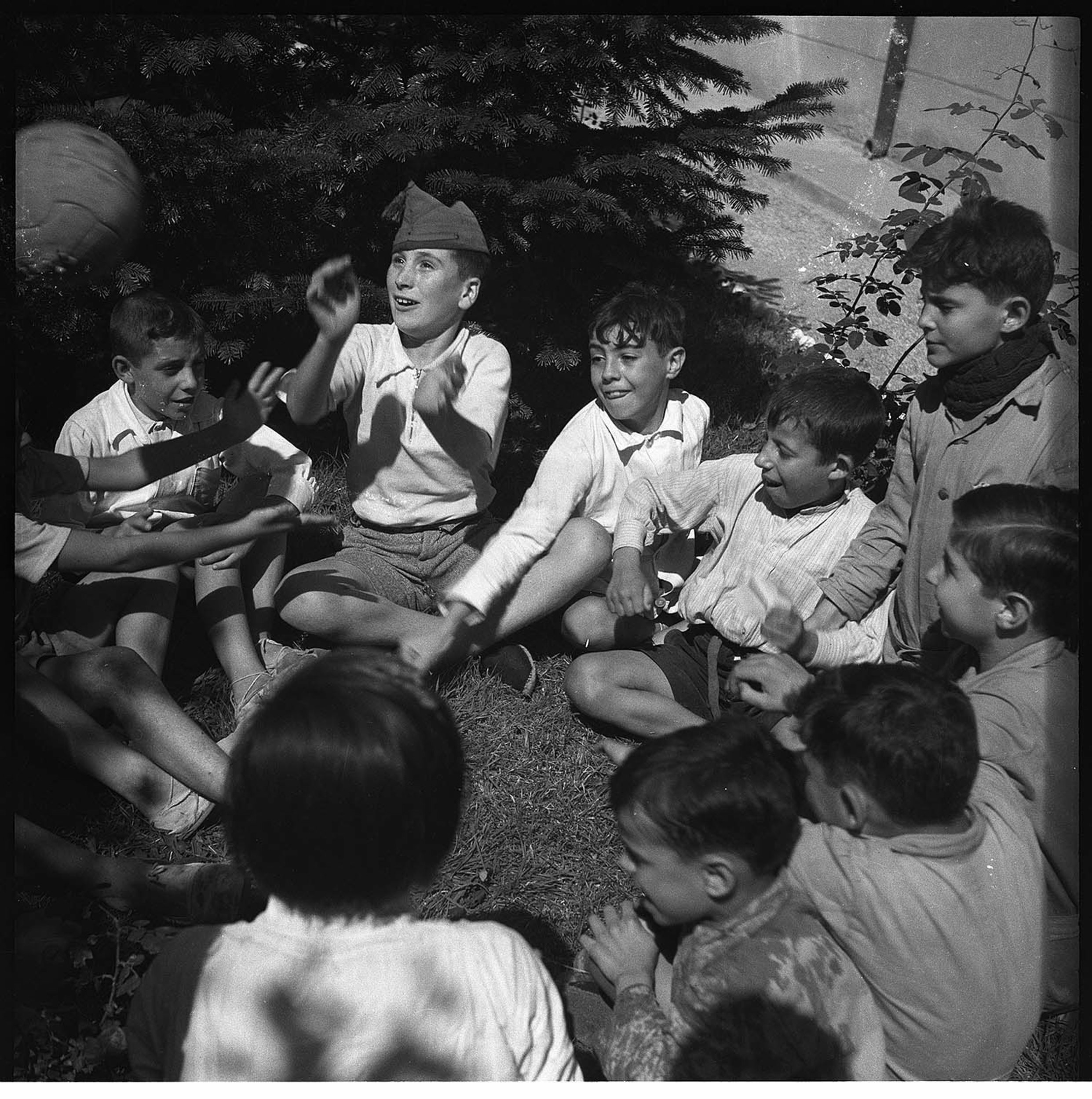 [War orphans seated in a circle, Madrid] | International Center of ...