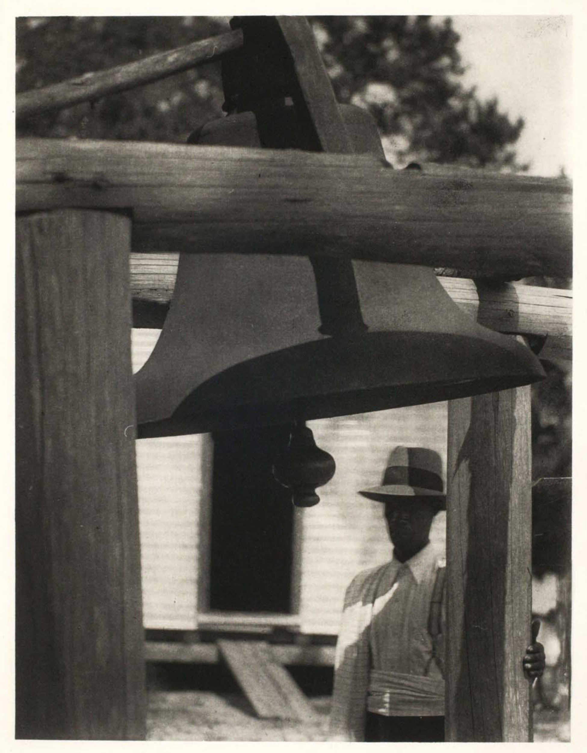 [Man with bell] | International Center of Photography