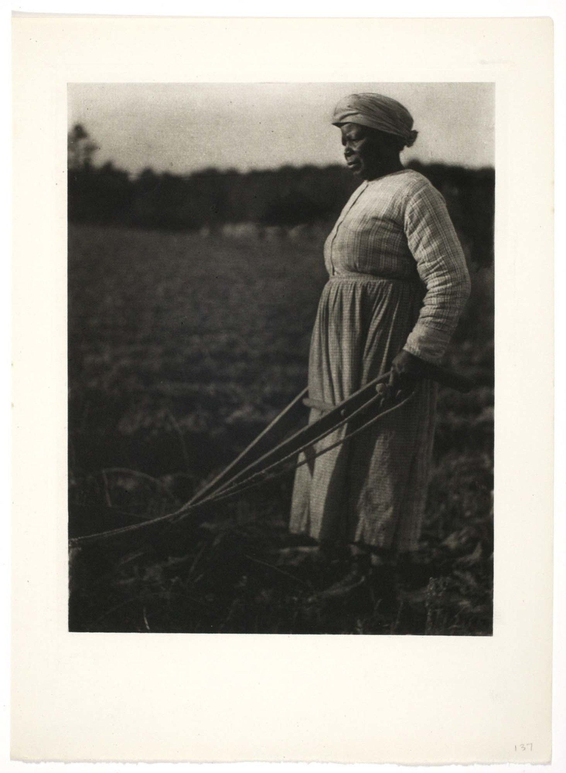 [Woman ploughing field] | International Center of Photography