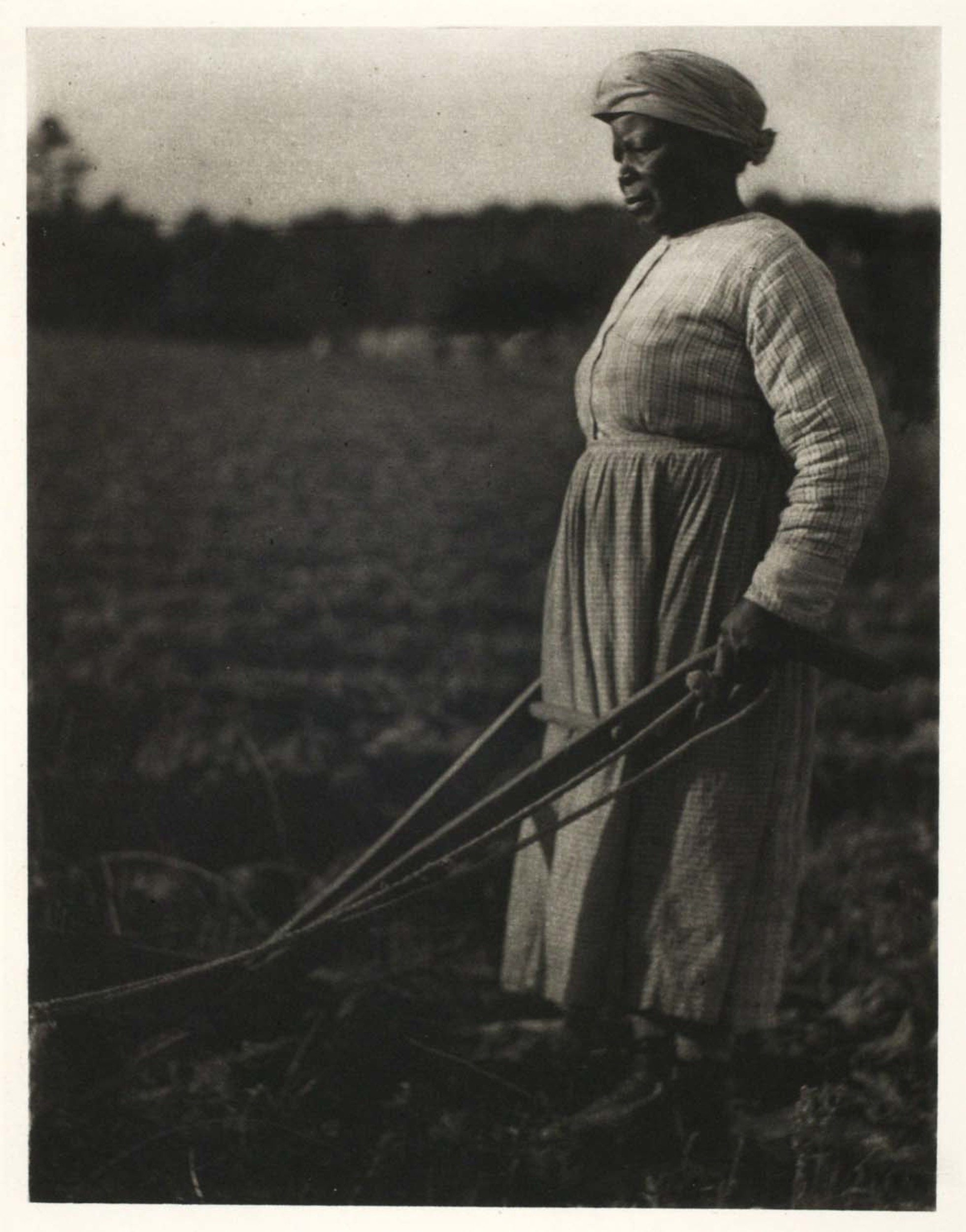 [Woman ploughing field] | International Center of Photography