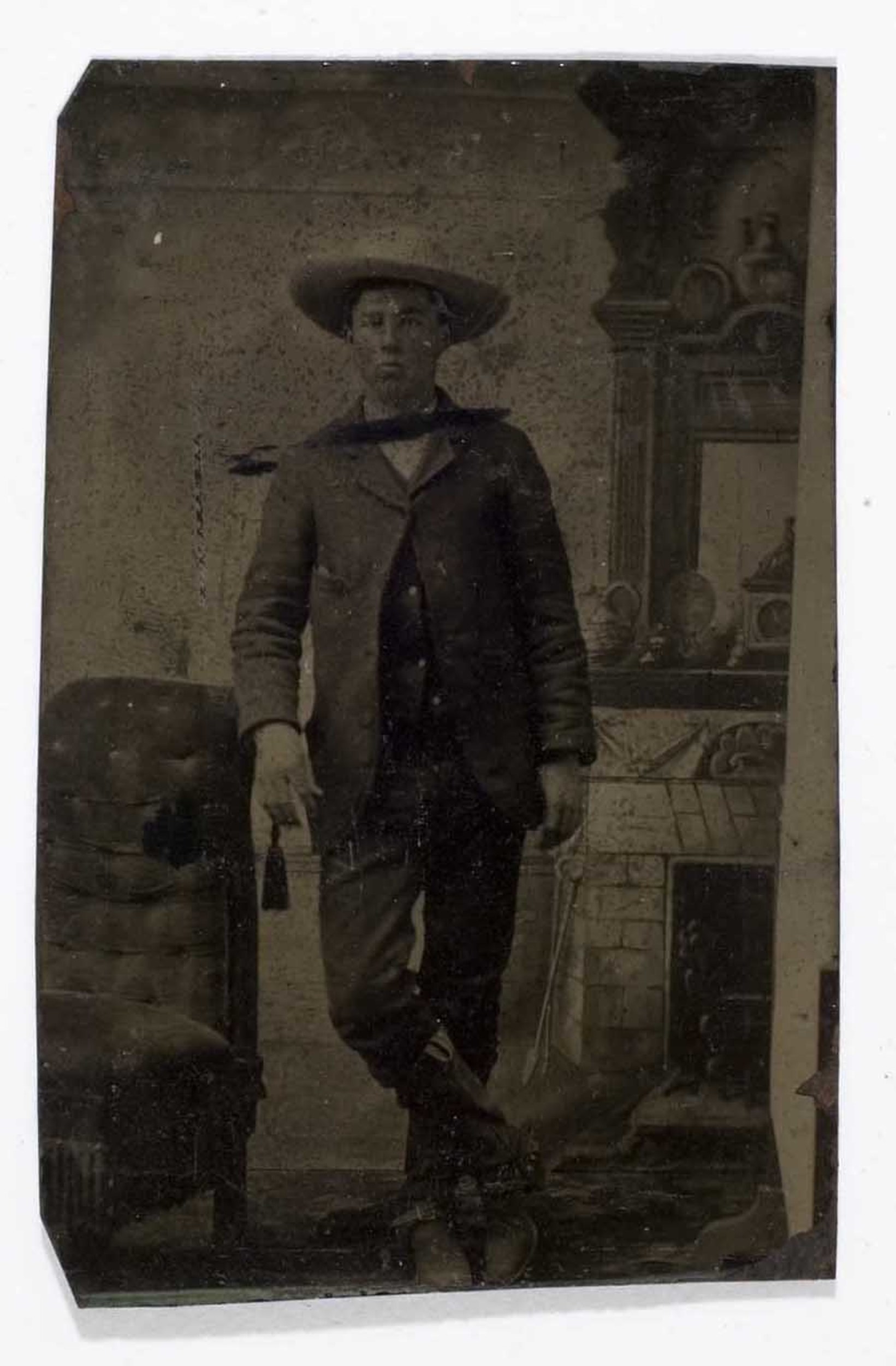 [Unidentified Man Standing next to Fireplace] | International Center of ...