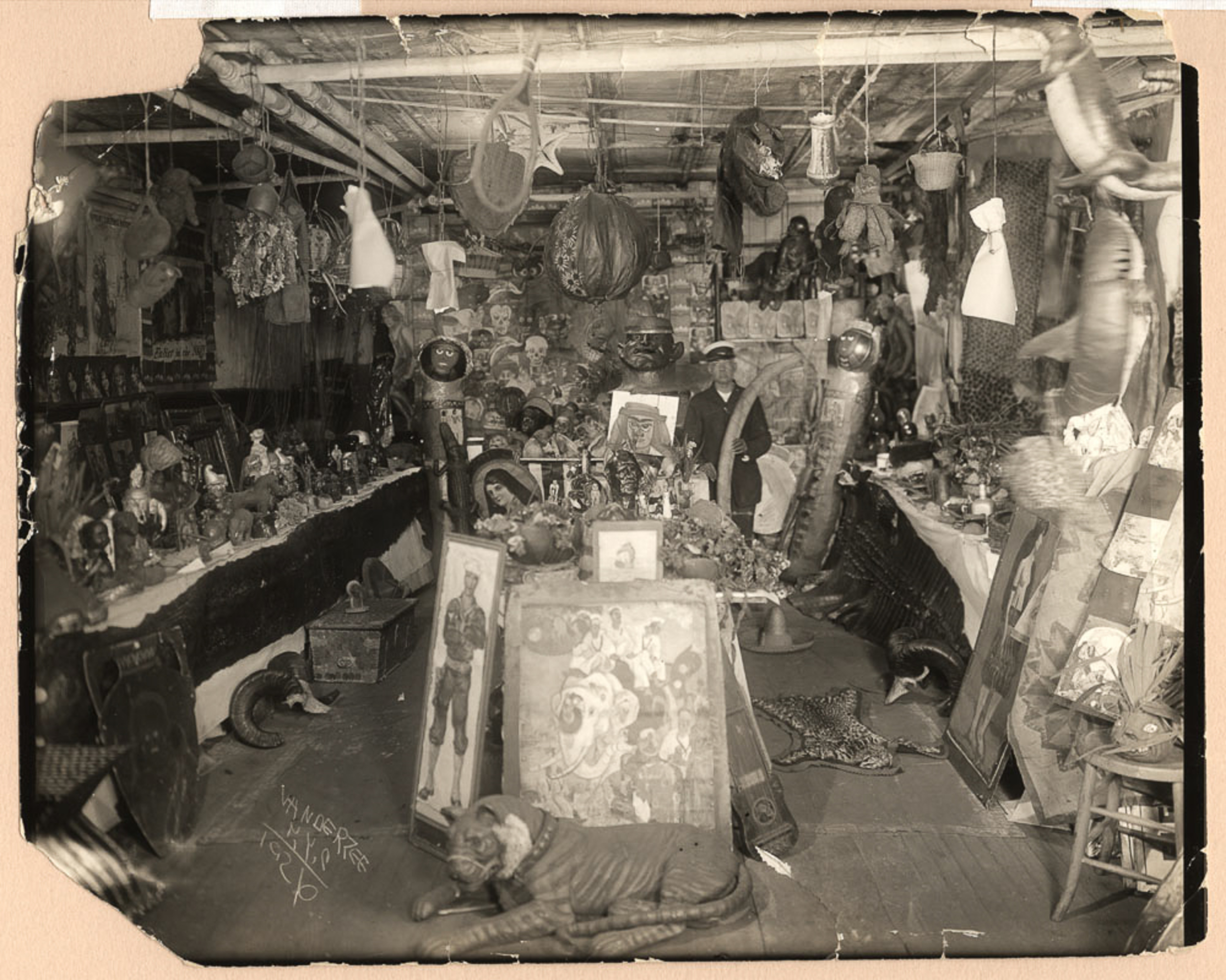 [Junk Shop with owner] | International Center of Photography