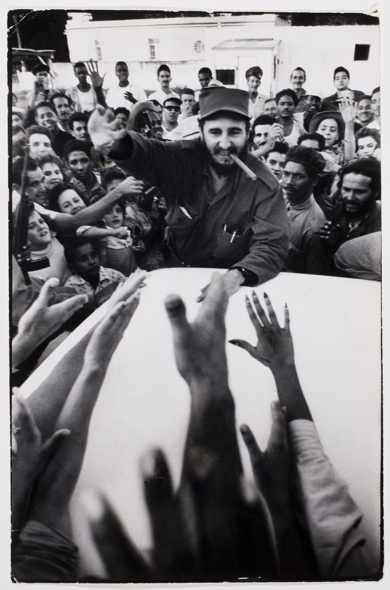 [Fidel Castro being cheered by a village crowd on his victorious march ...