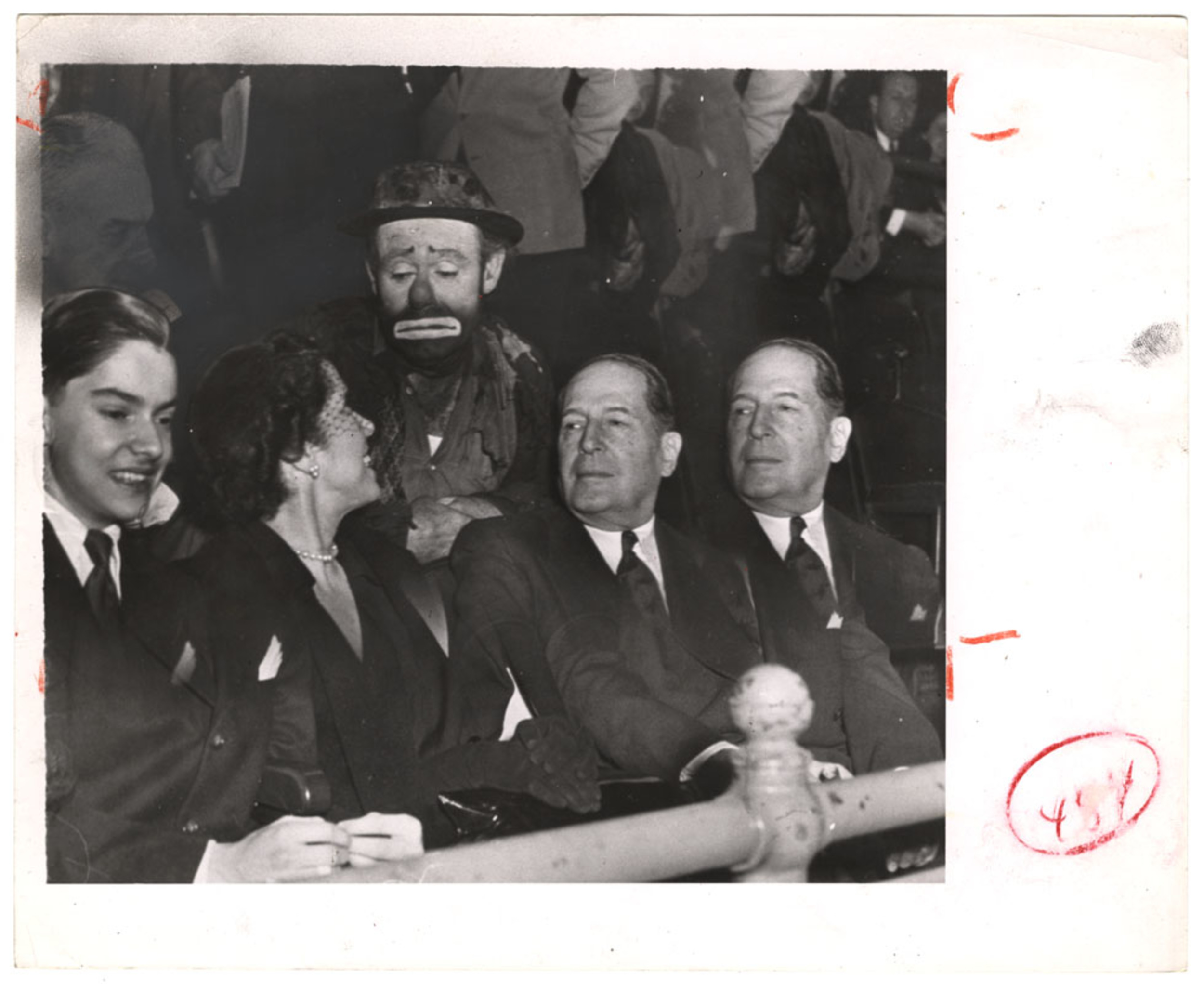 Gen. Douglas MacArthur and family at Circus. Clown is Emmett Kelly ...