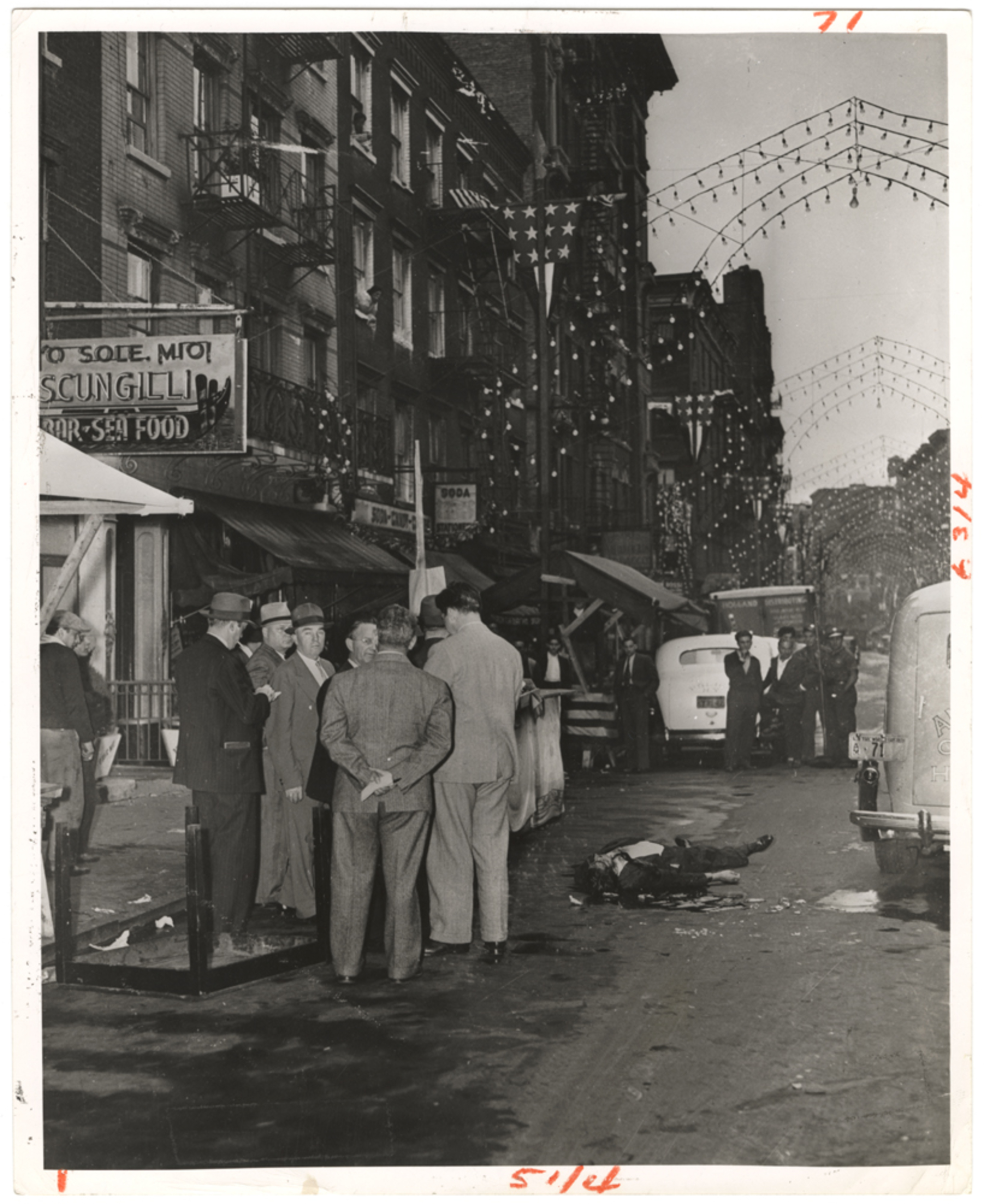 [Police and bystanders with body of racketeer Joseph (Little Joe) La ...