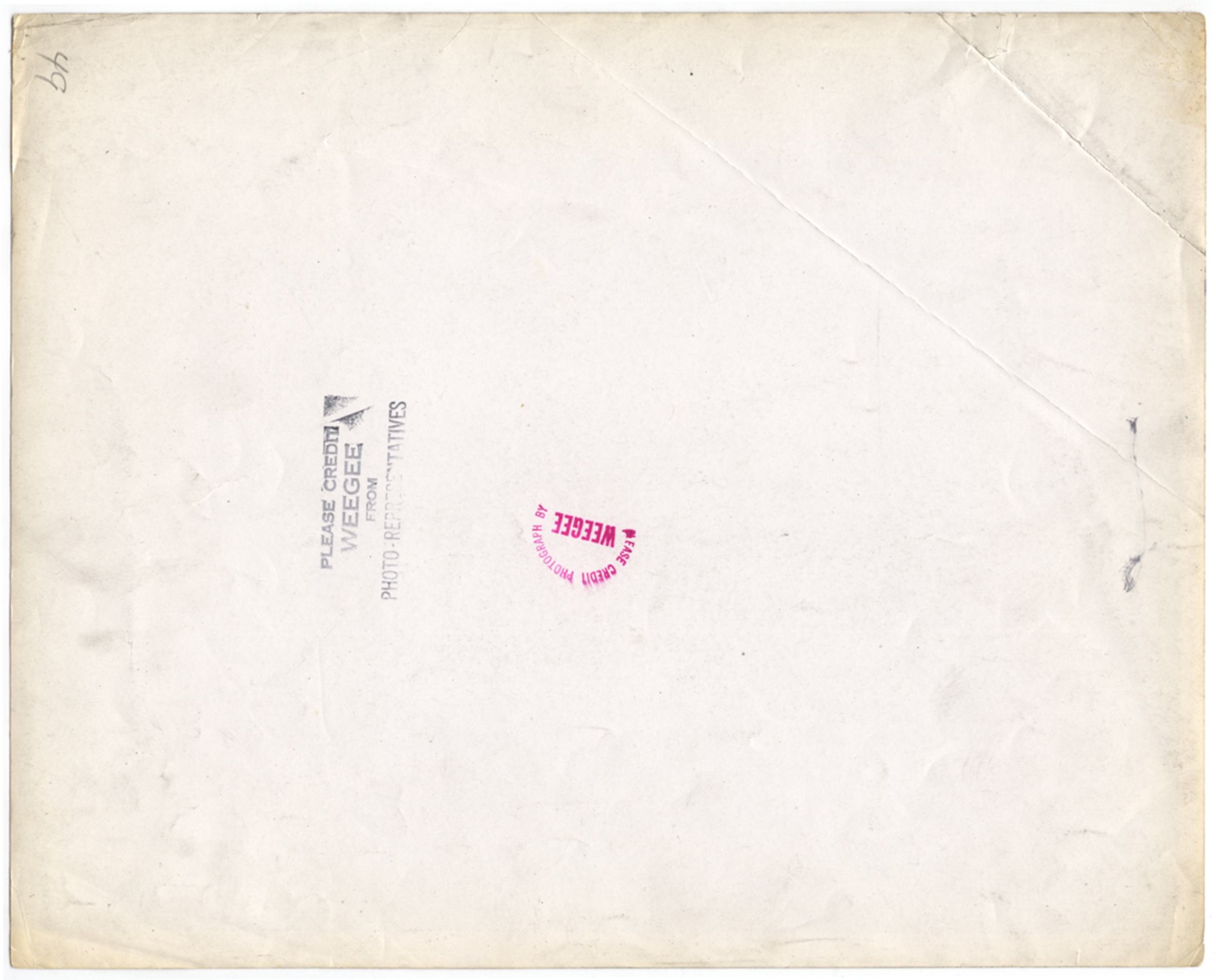 [Man chasing chicken, New York] | International Center of Photography