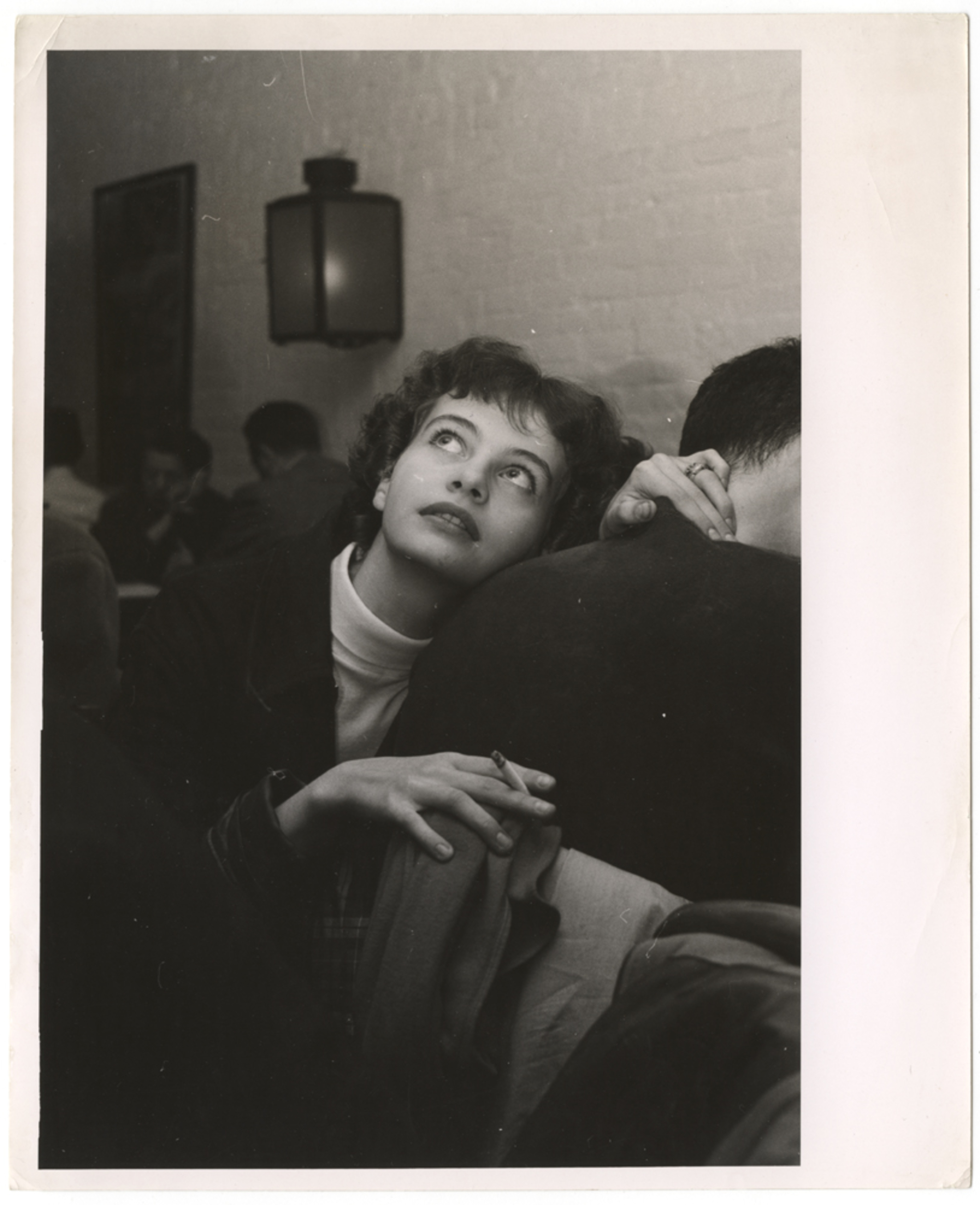 [woman looking up and smoking, at the Limelight] | International Center ...