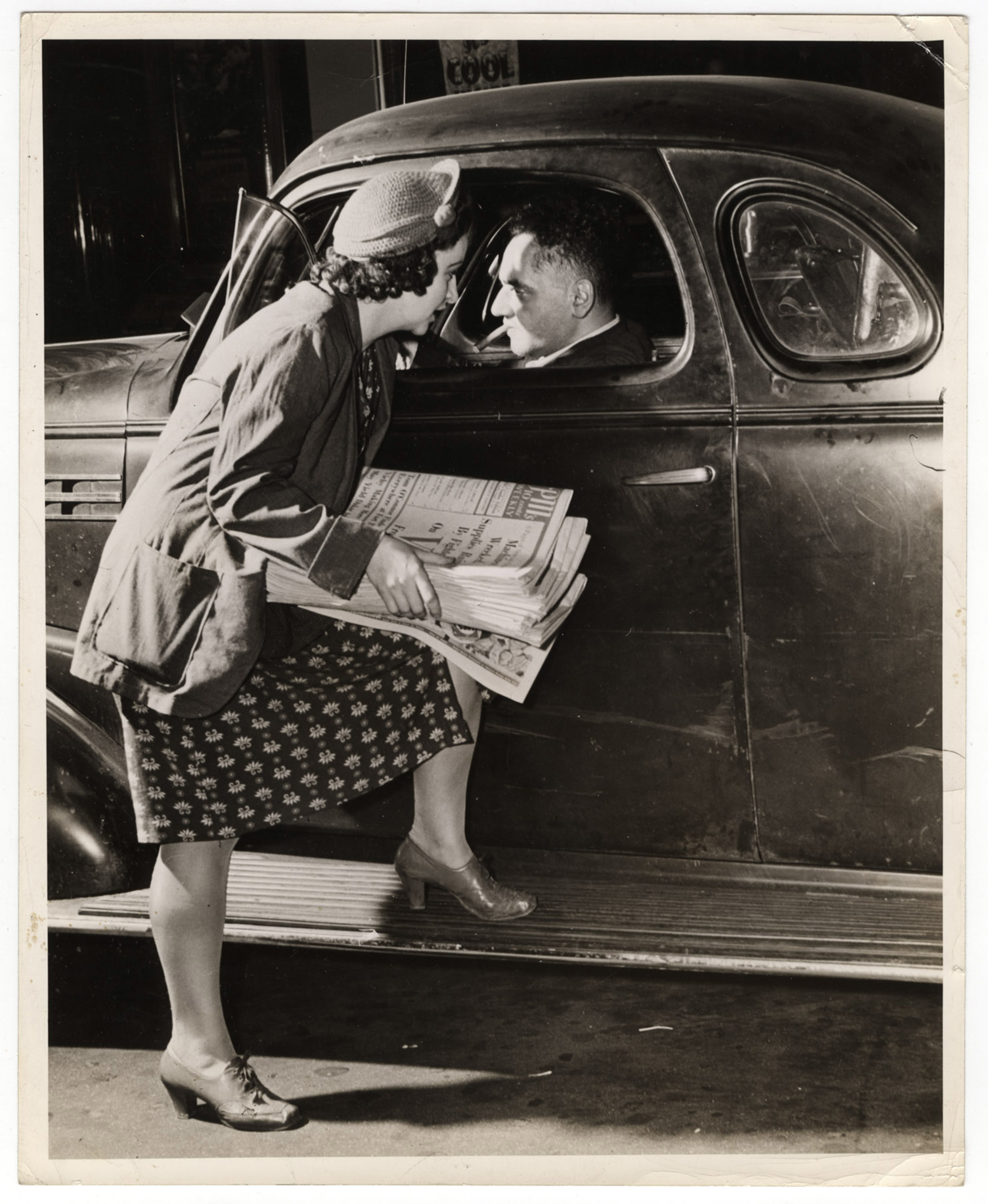 [Weegee gets a tip from a PM news seller, New York] | International ...