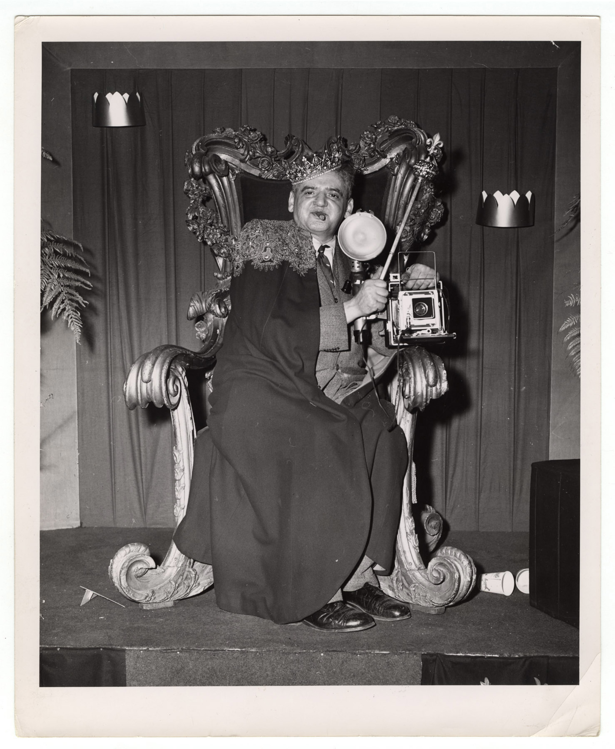 [Weegee as king, holding scepter and camera] | International Center of ...