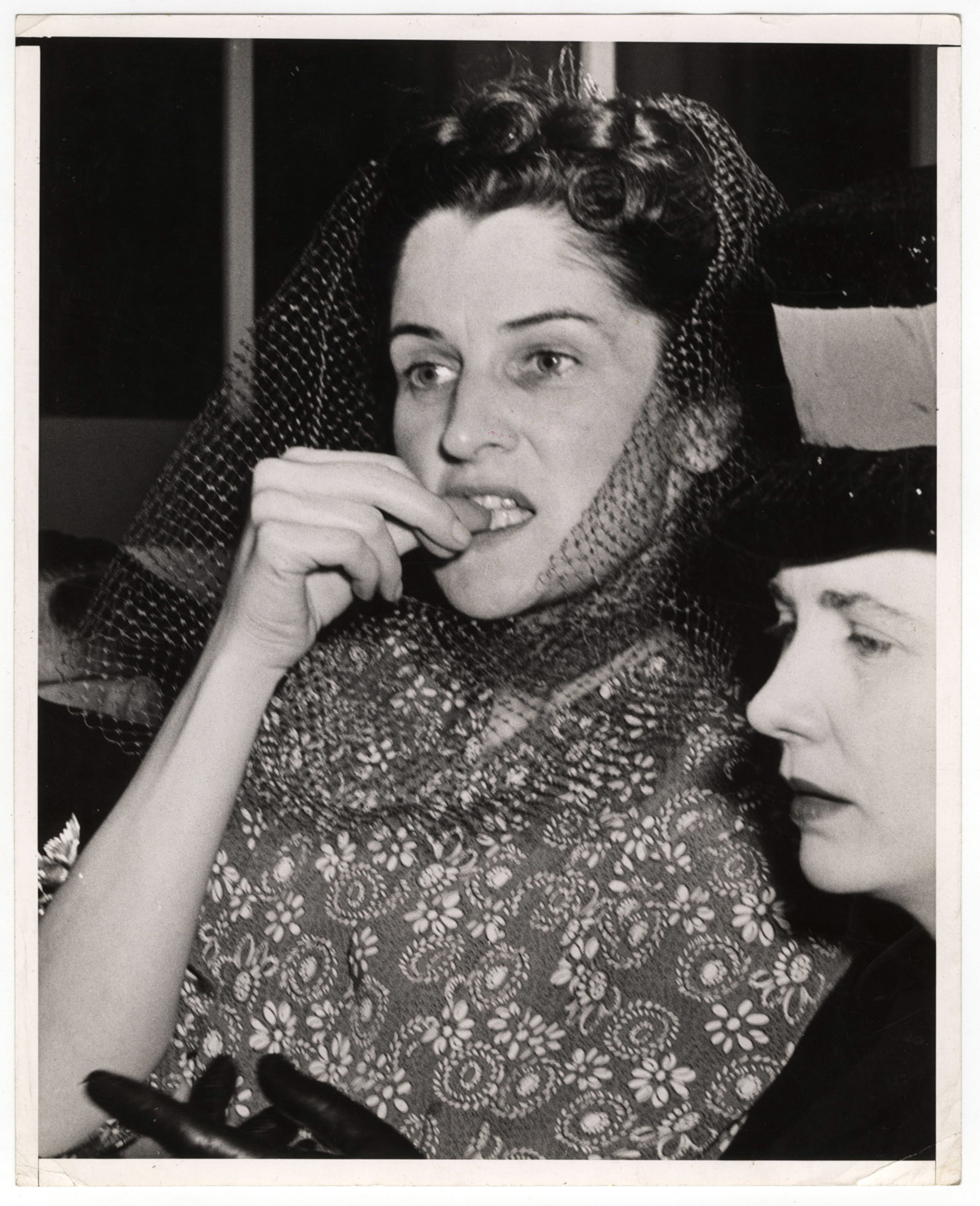 [A young woman reacts to Weegee's photograph "The Critic" at the Museum ...