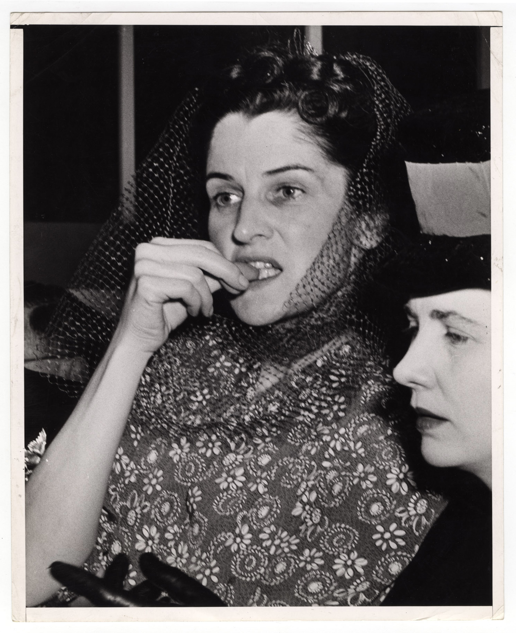 [A young woman reacts to Weegee's photograph "The Critic" at the Museum ...