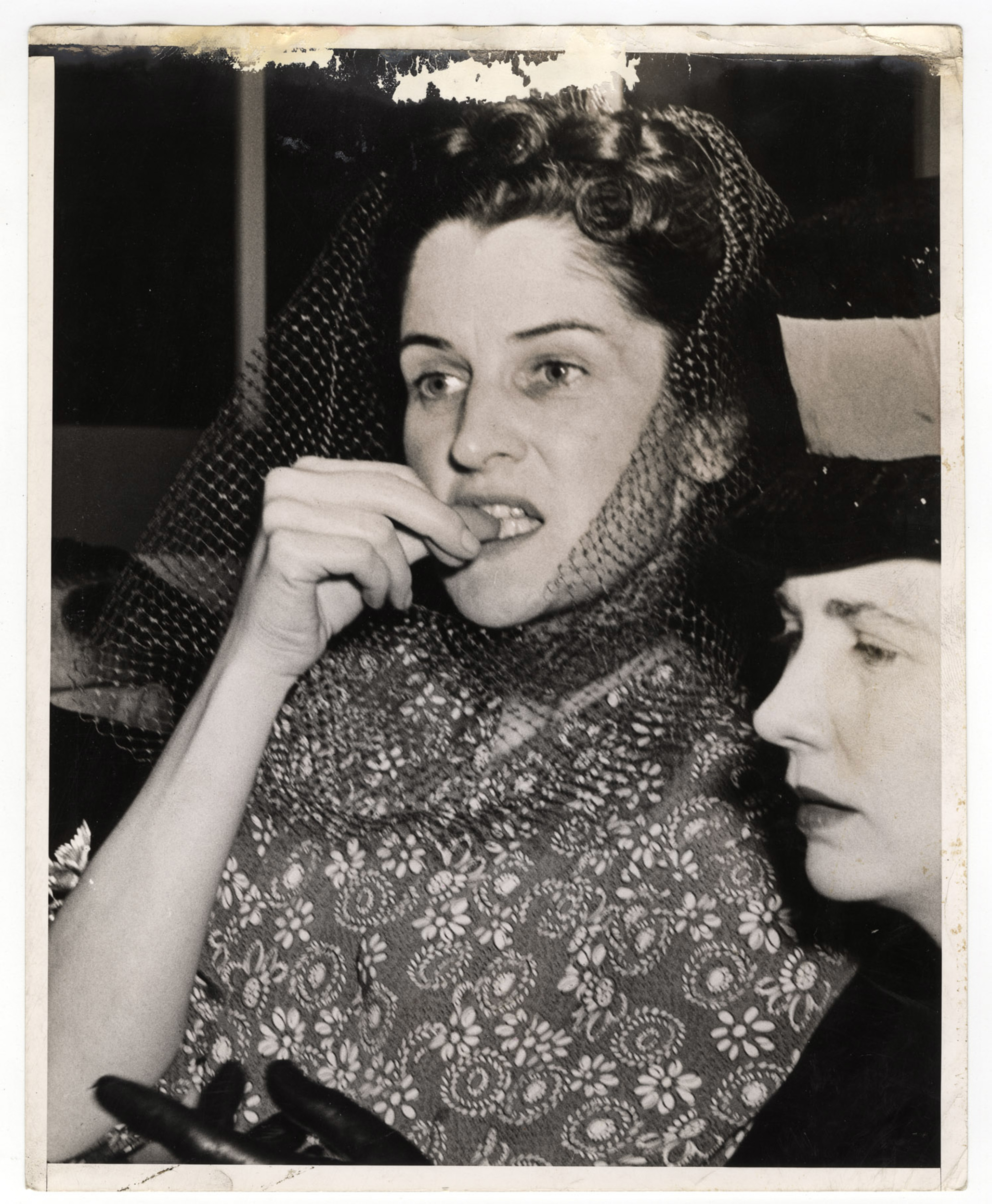 [A young woman reacts to Weegee's photograph "The Critic" at the Museum ...