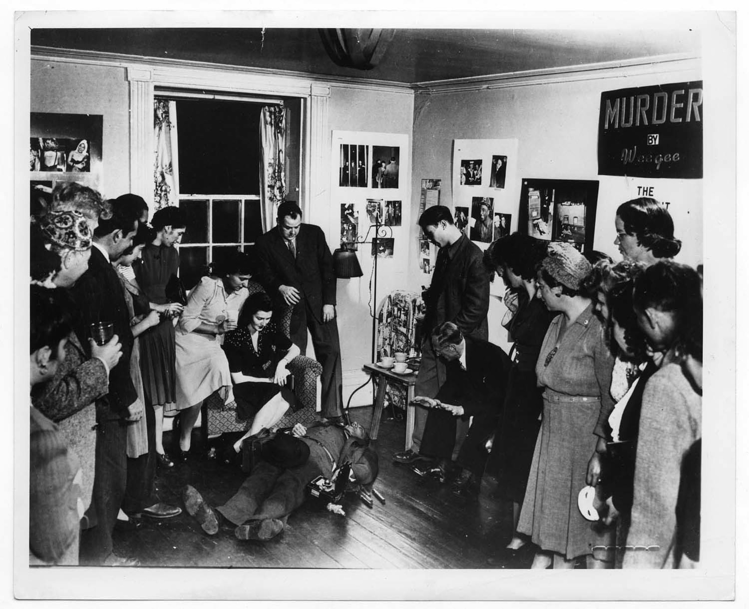[Weegee playing dead for audience at "Murder by Weegee," The Gamut Arts ...