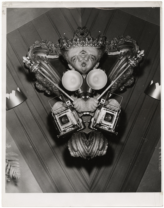 [Distorted self-portrait wearing crown and smoking cigar, holding Speed ...