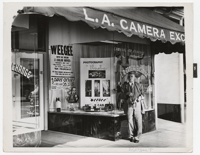 [Weegee standing in front of L.A. Camera Exchange] | 1International ...