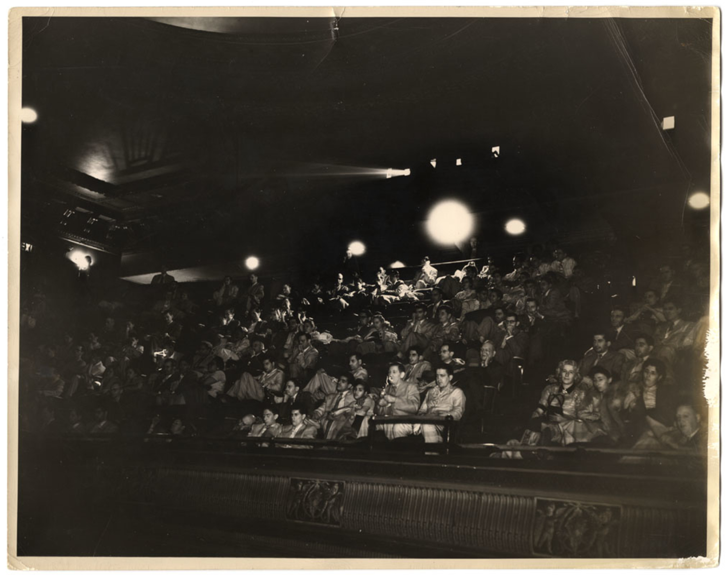 Movie theater audience in the balcony | International Center of Photography