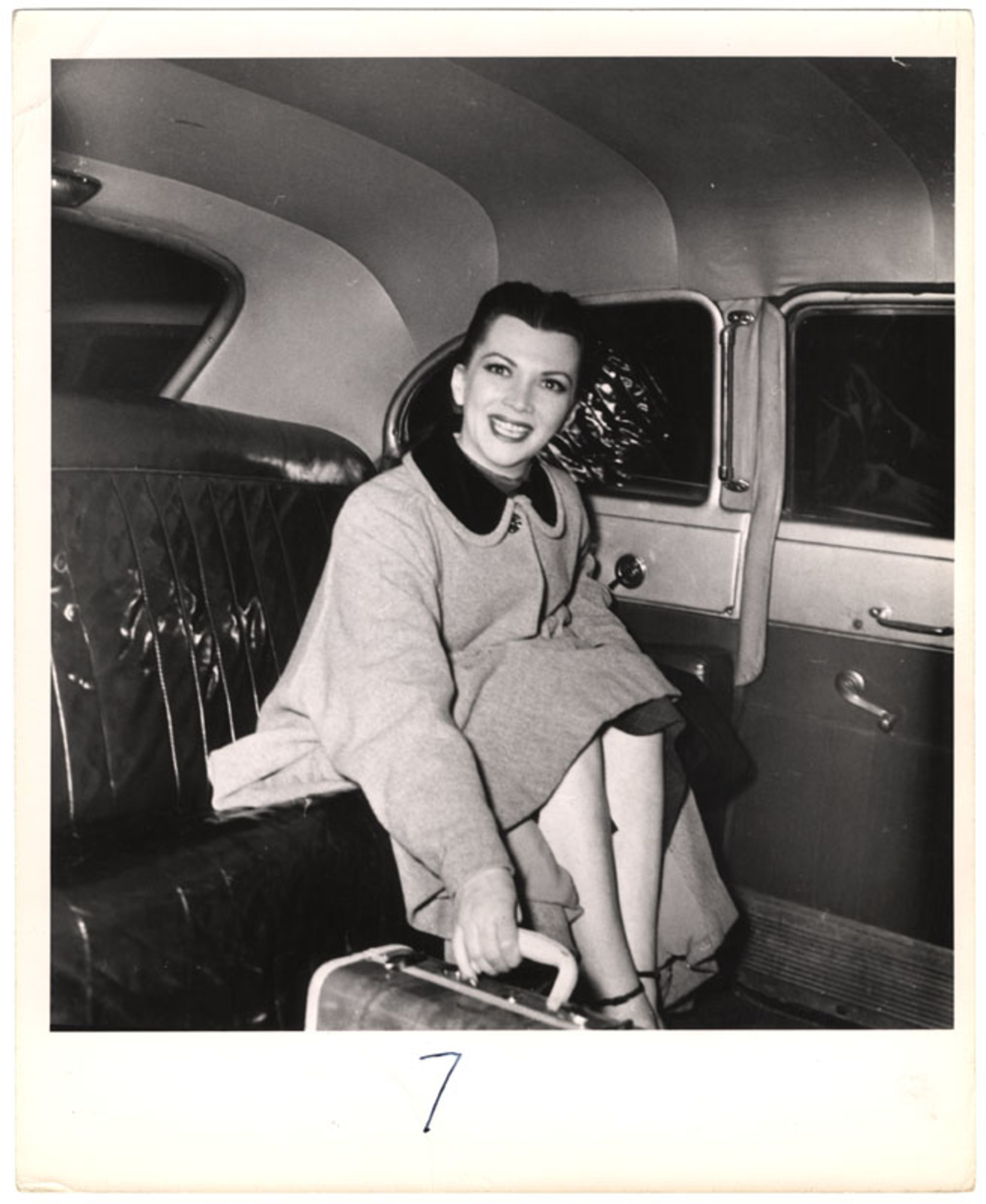 Showgirl (Sherry Britton) in car | International Center of Photography