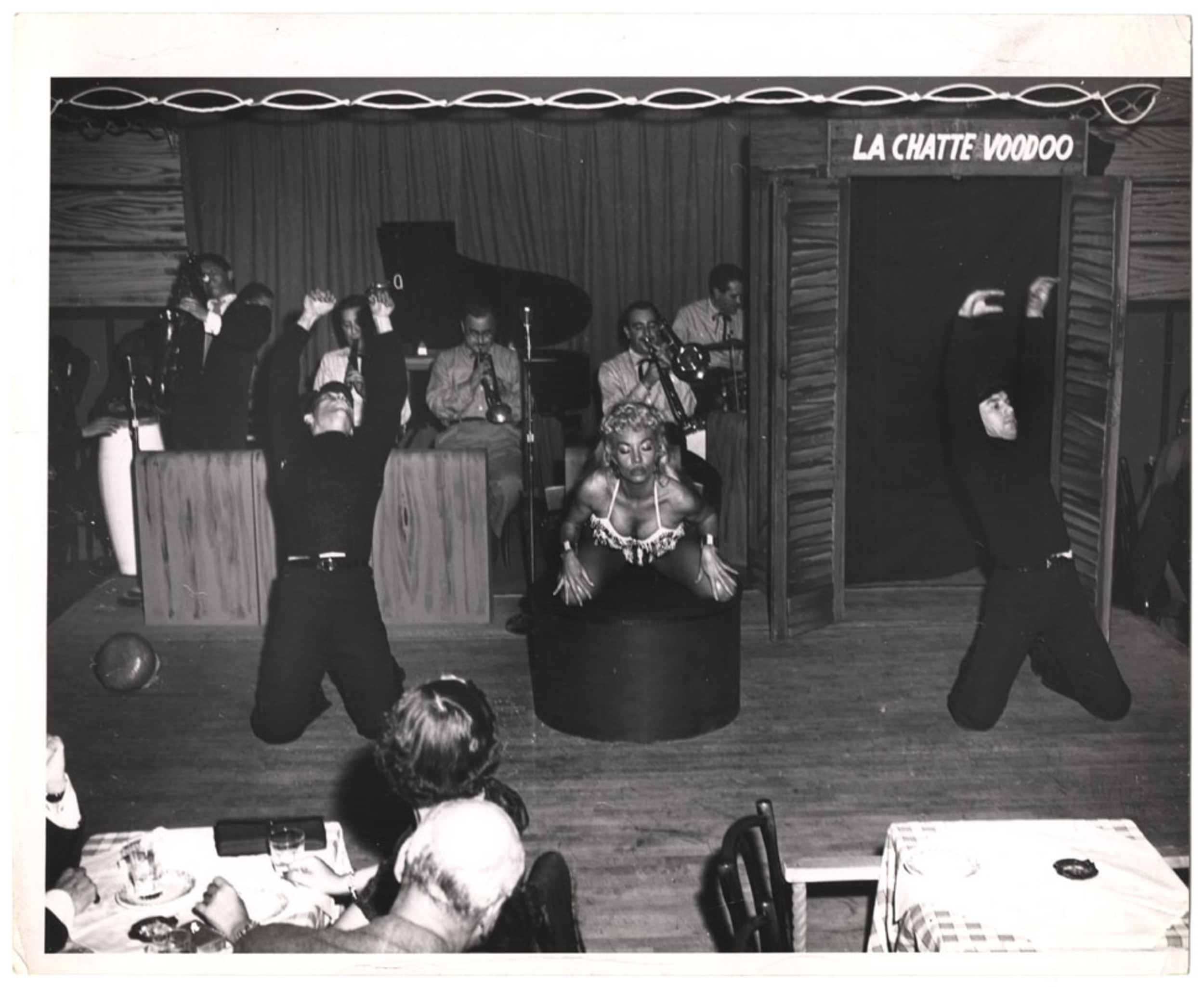 [Showgirl Lilly Christine and two men dancing in front of band, New ...