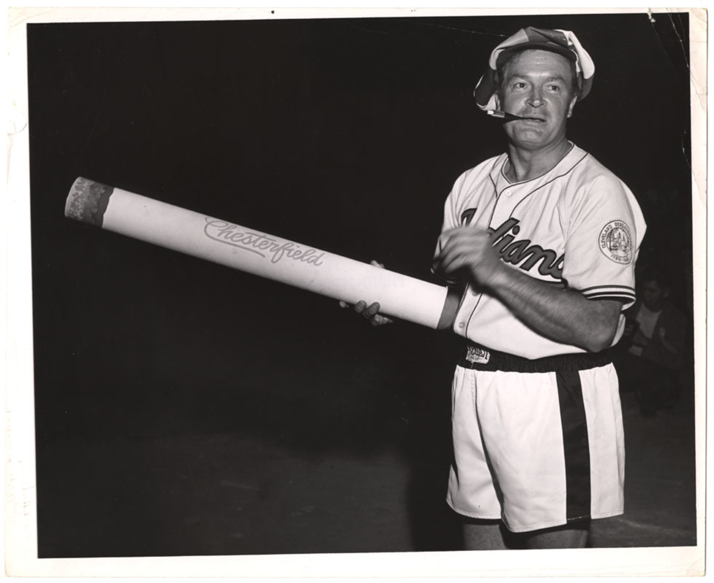 [Bob Hope wearing Indians baseball jersey and holding a large ...