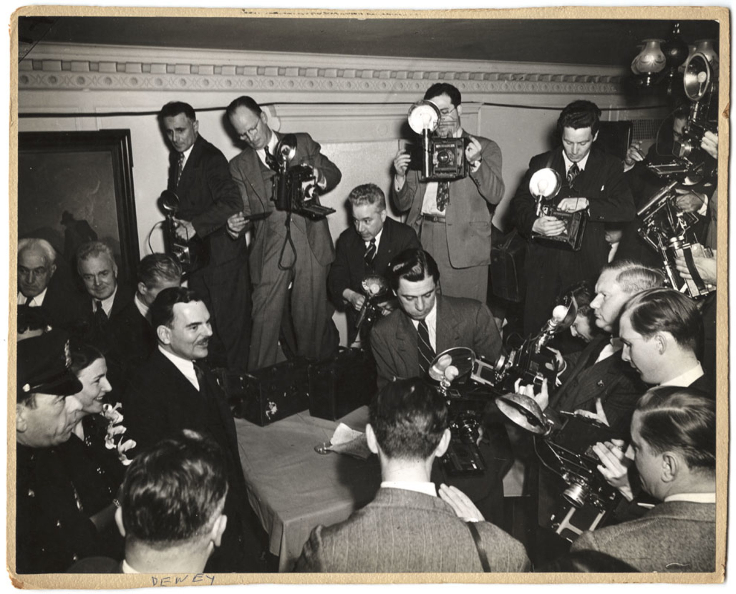 [Thomas E. Dewey besieged by photographers on way to make Victory ...