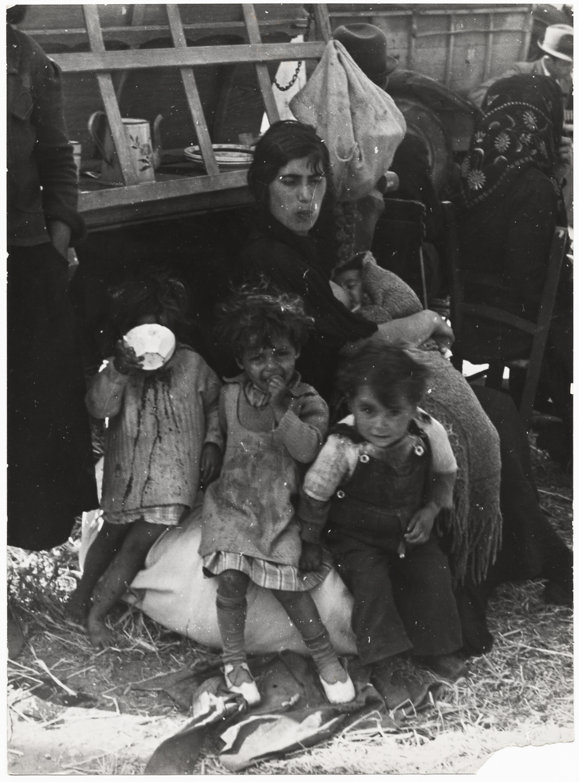 [Gypsy woman breast feeding a baby and three children, France ...