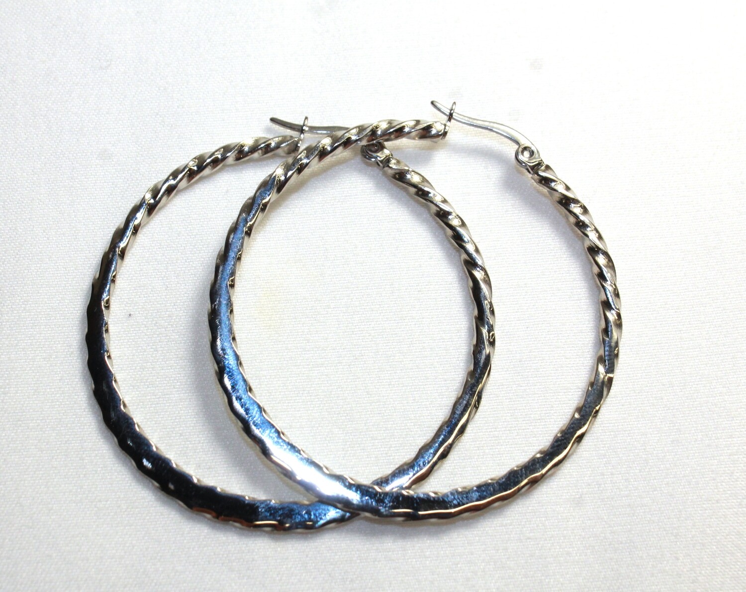Twisted 2" Stainless Steel Hoops | store-shop - American Jewelry and Loan