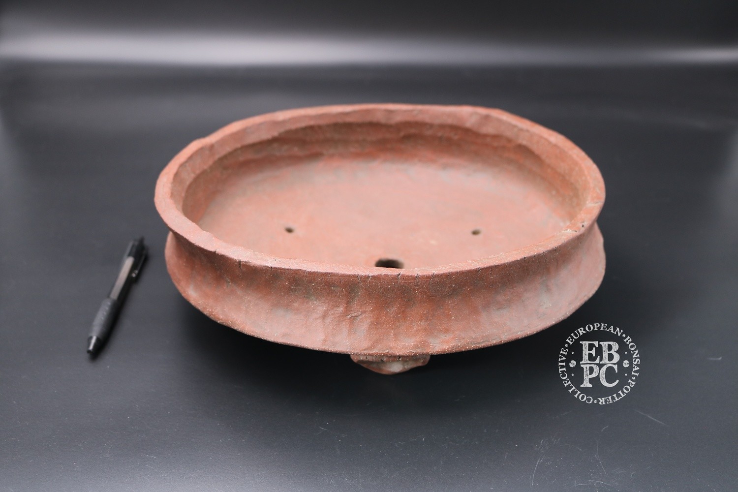 SOLD - Holvila - 27cm; Unglazed; Round; Reddish Clay;
