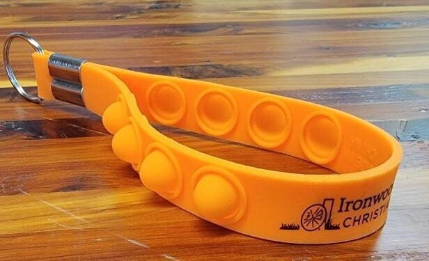 Ironwood Branded Push Pop Fidget Wrist Strap Keychain (Orange)