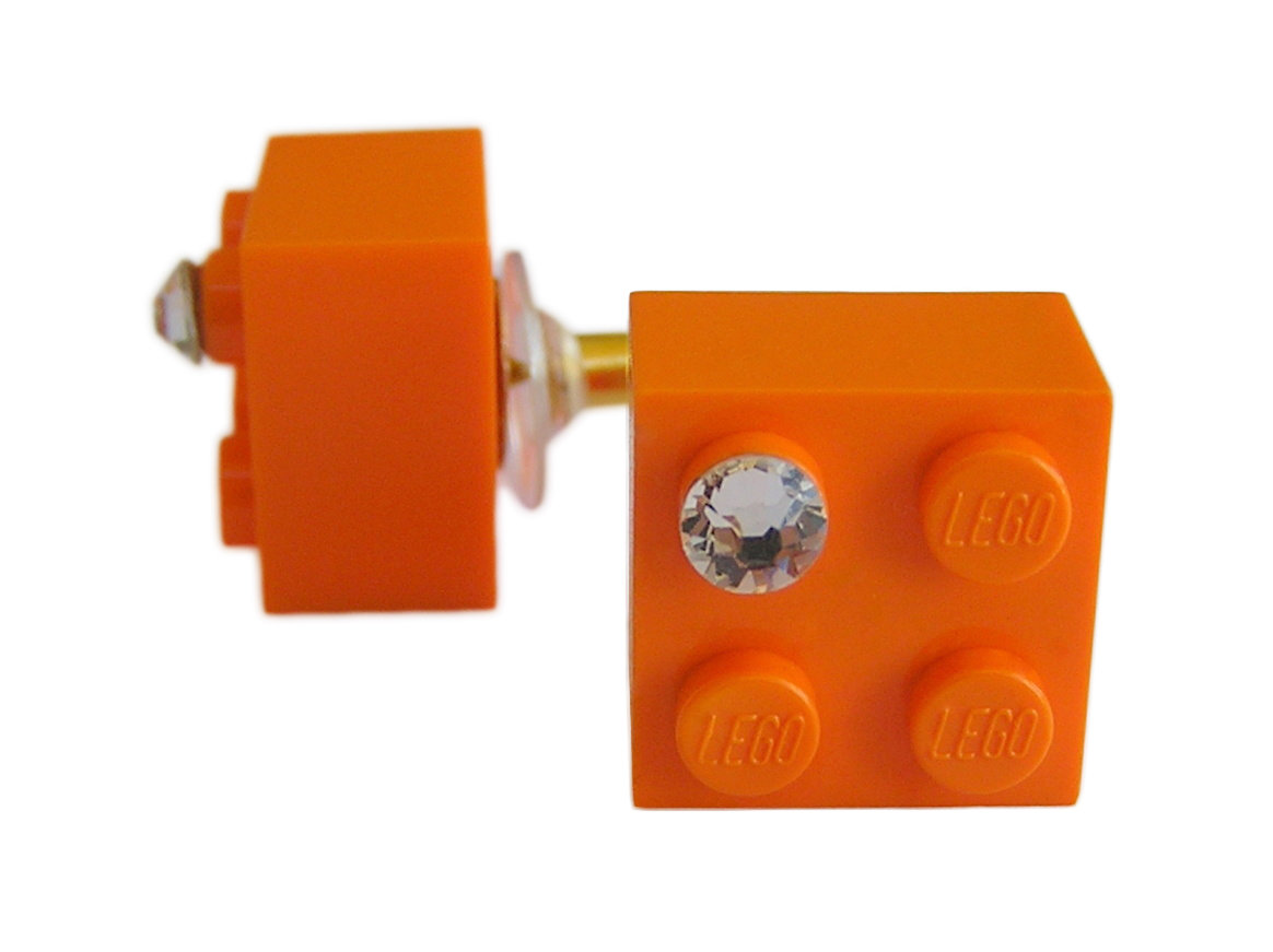 Orange LEGO® brick 2x2 with a ‘Diamond’ color SWAROVSKI® crystal on a ...