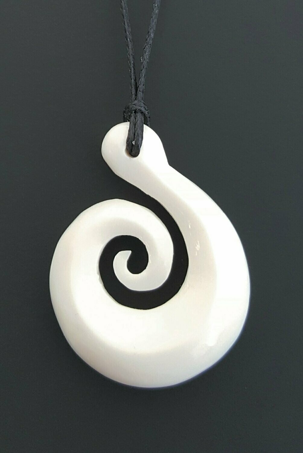 Moko Pounamu Black Fern Bone Carving Koru
