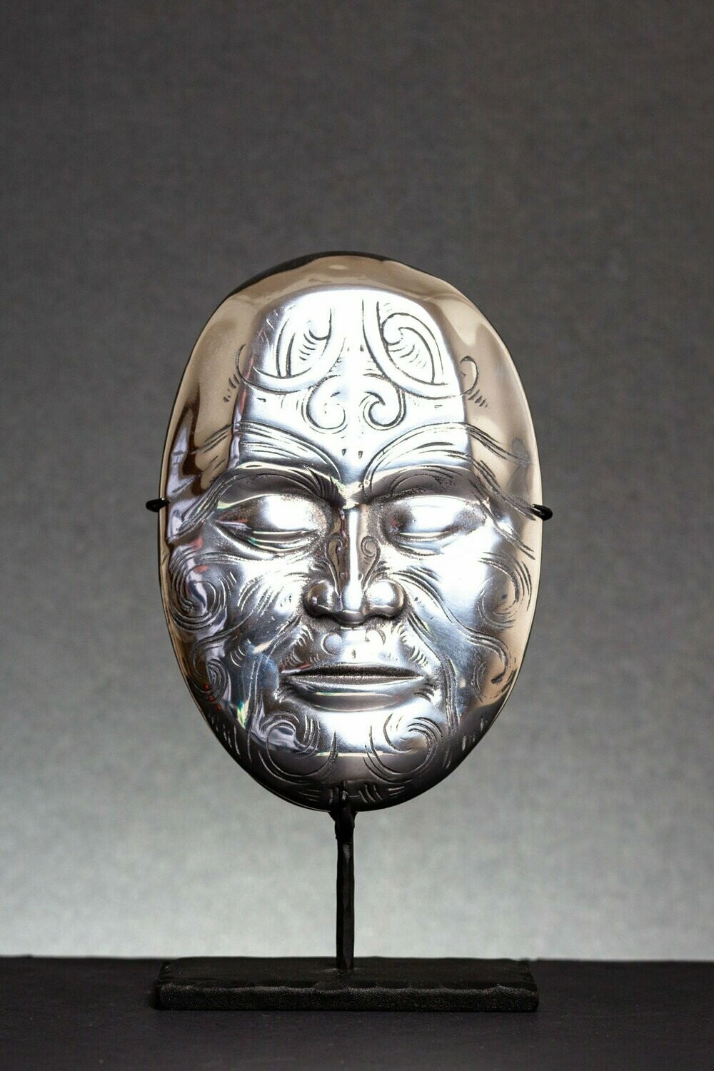 Moko Face Casting on a forged Iron base - Awhitu