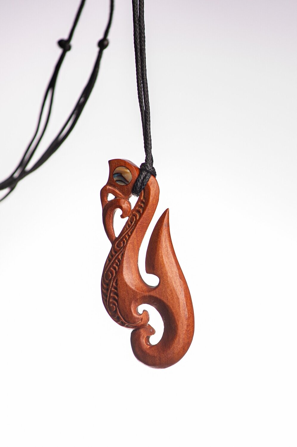 Moko Pounamu, Wood Carving Manaia