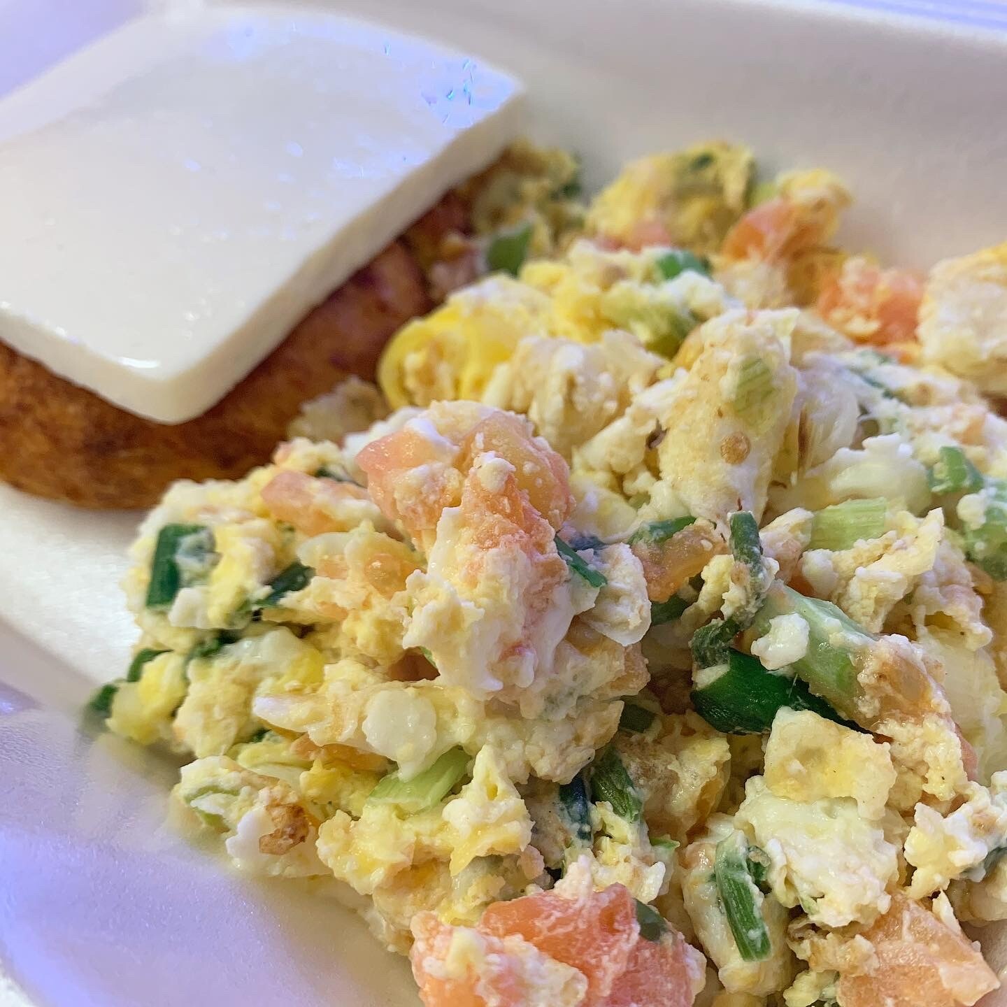 Colombian Breakfast - perico eggs / arepa / queso slice